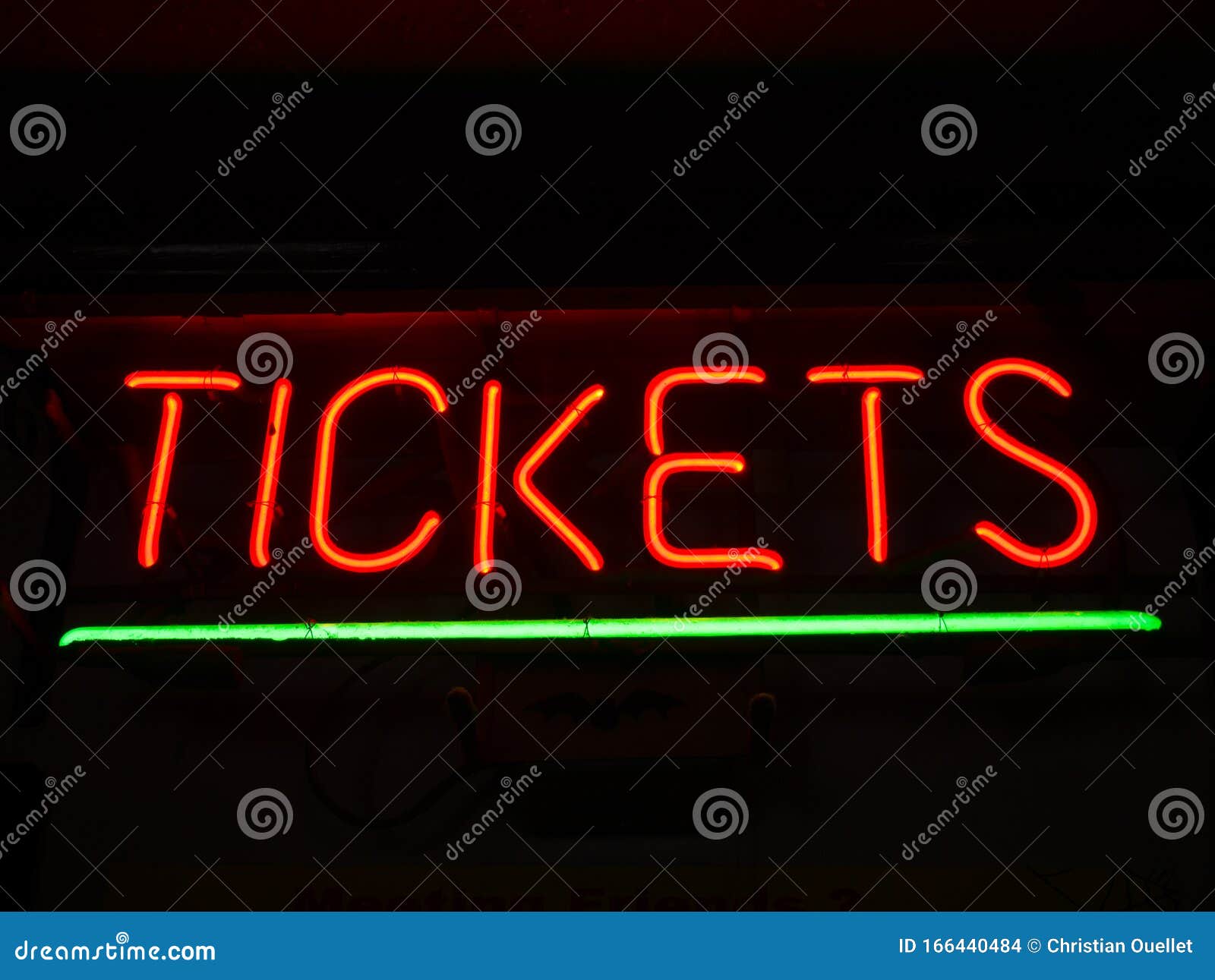 Glowing Red Neon Tickets Sign Stock Photo - Image of exterior, bright ...