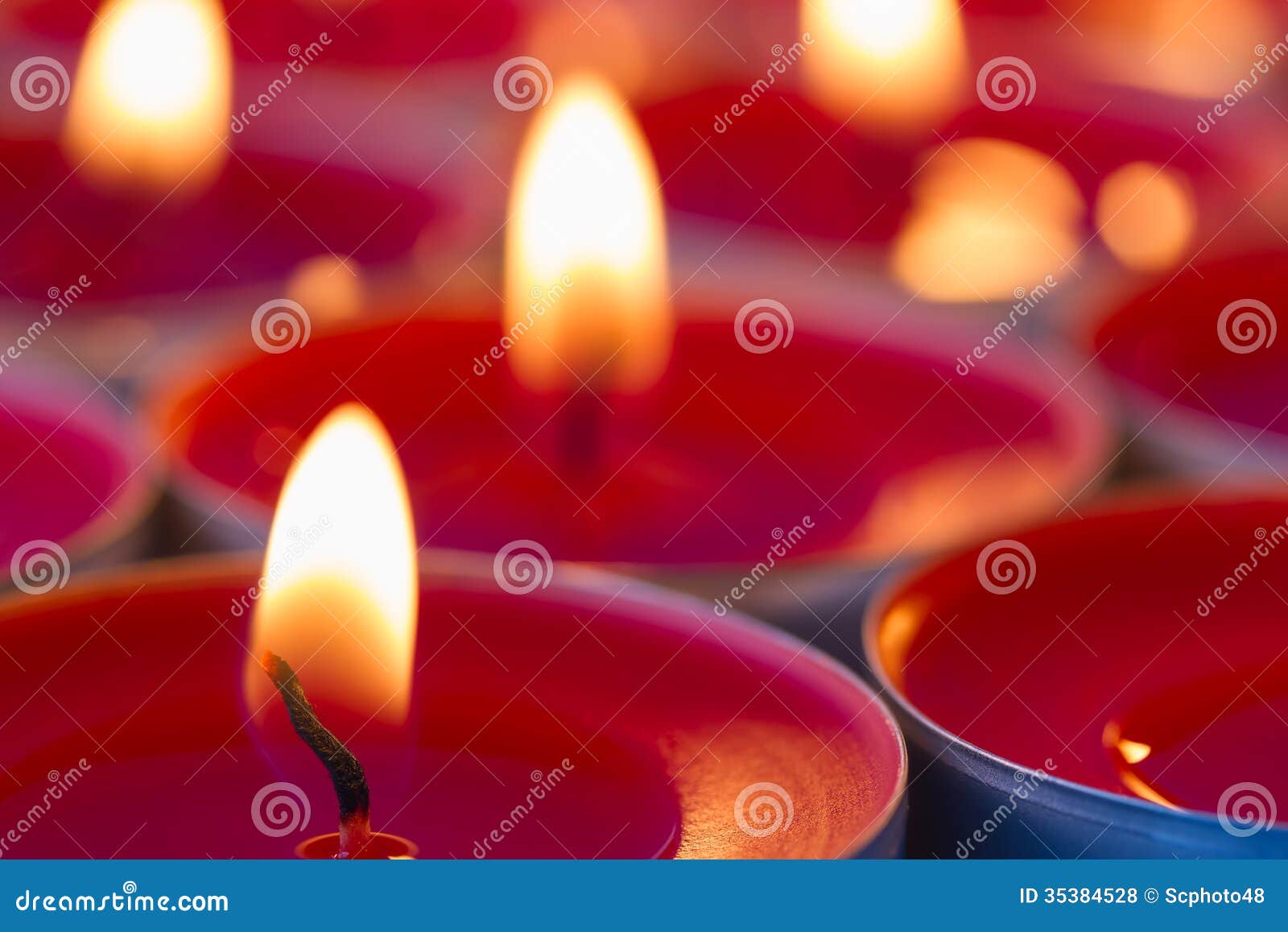 Glowing red tea lights stock photo. Image of burning - 35384528