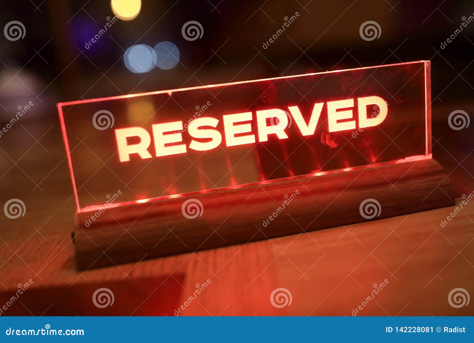Glowing Sign Reserved stock image. Image of neon, exclusive - 142228081