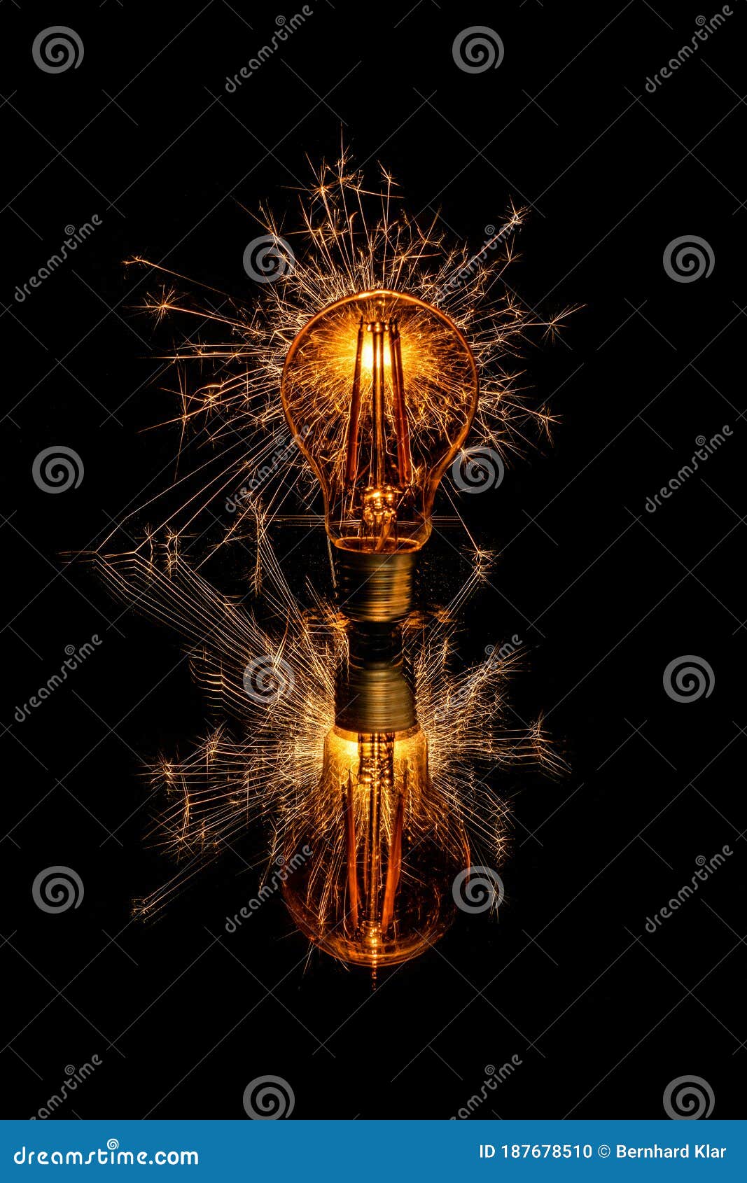 Glowing Sparkler Behind a Retro Light Bulb Stock Photo - Image of bulb ...