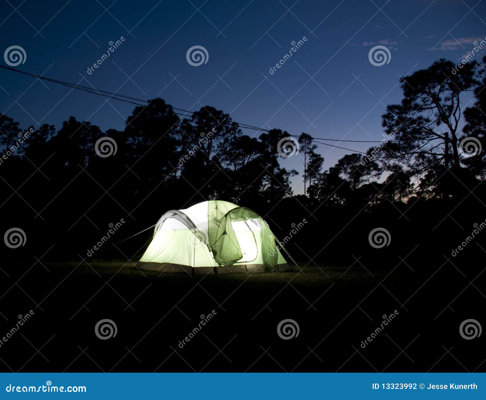 Glowing Tent at Night stock photo. Image of trees, green - 13323992