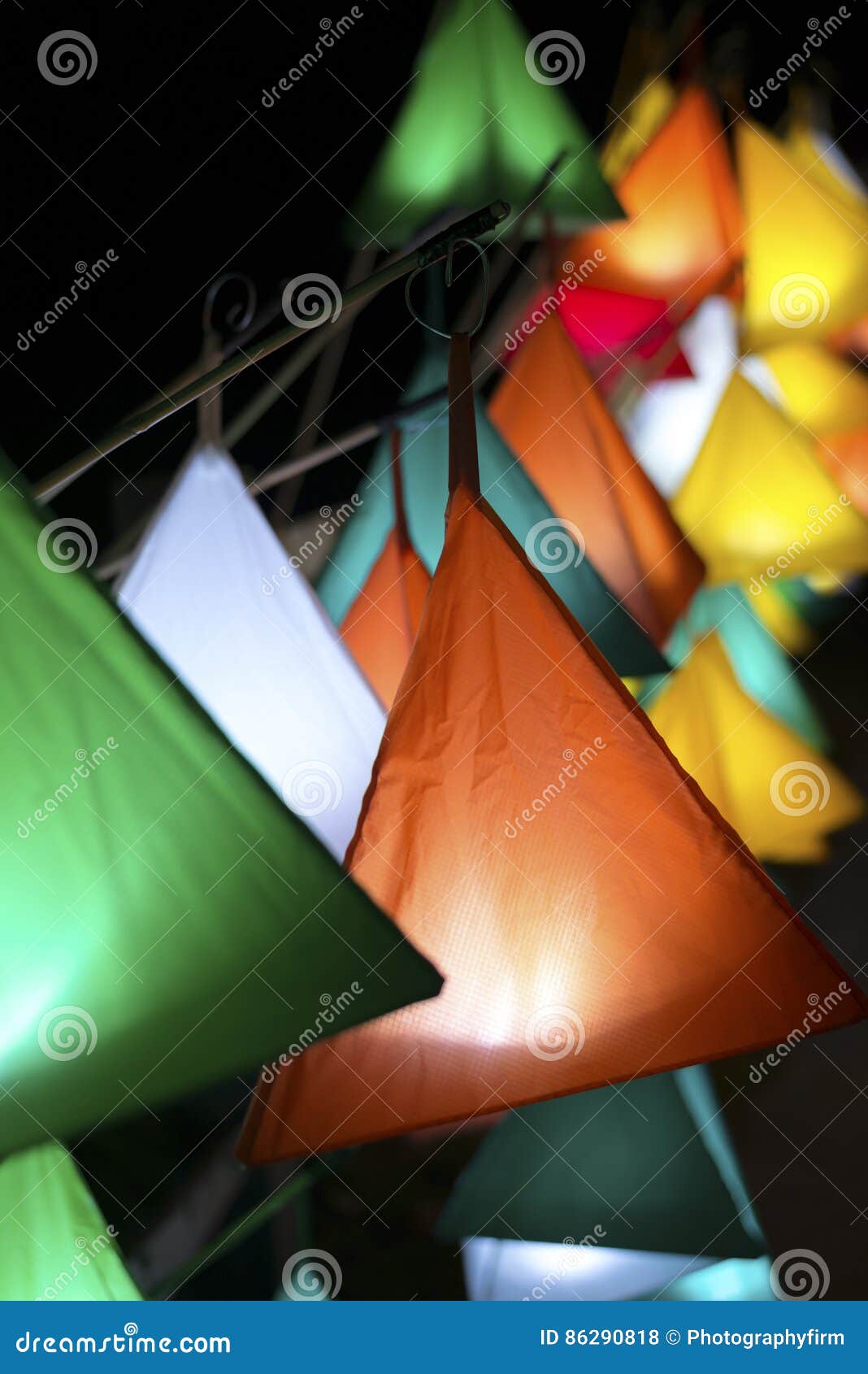 Glowing Triangular Paper Lanterns in the Dark Stock Photo - Image of ...
