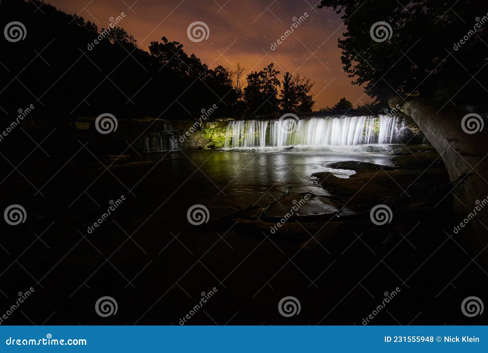 Glowing White Waterfalls at Night Under a Star Filled Sky at Cataract ...