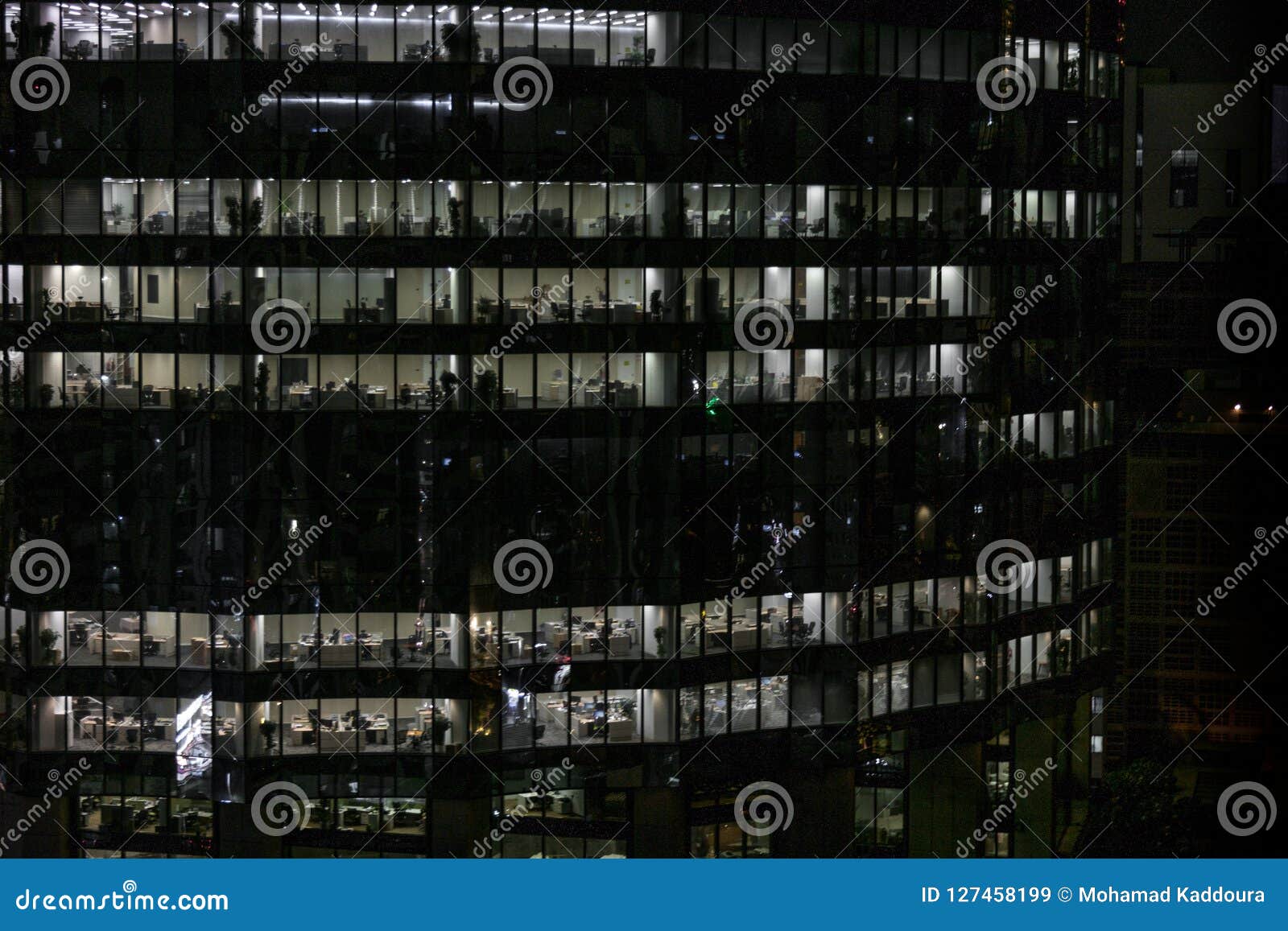 Glowing Windows of Skyscrapers at Evening - View of Modern Offices in a ...