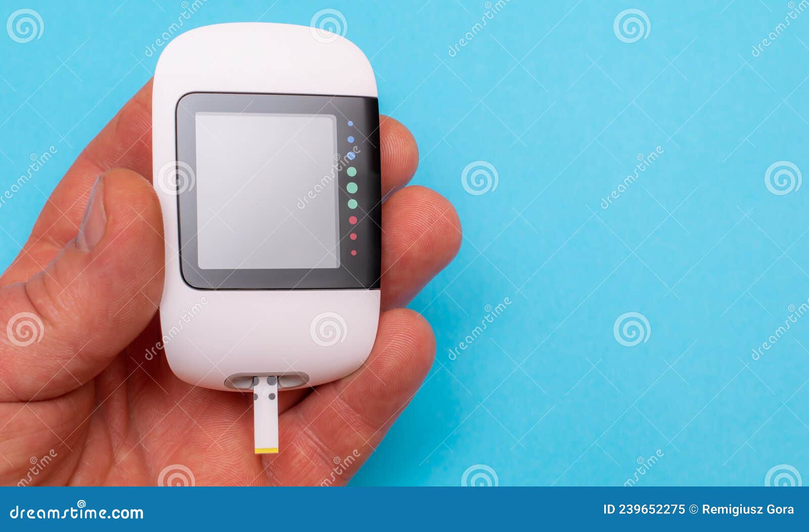 Glucometer on a Blue Background. Electronic Diagnostic Device Stock ...
