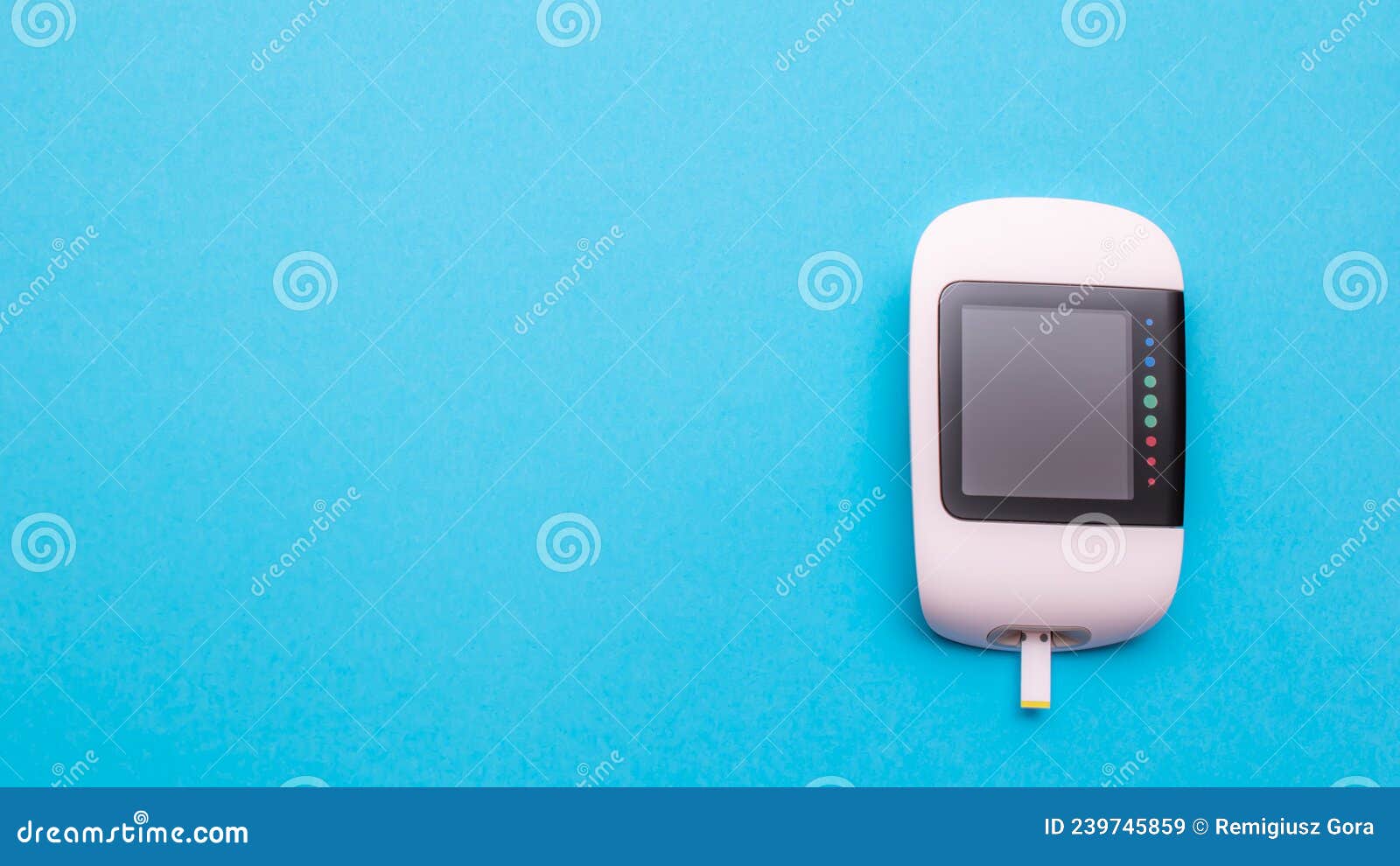 Glucometer on a Blue Background. Electronic Diagnostic Device Stock ...