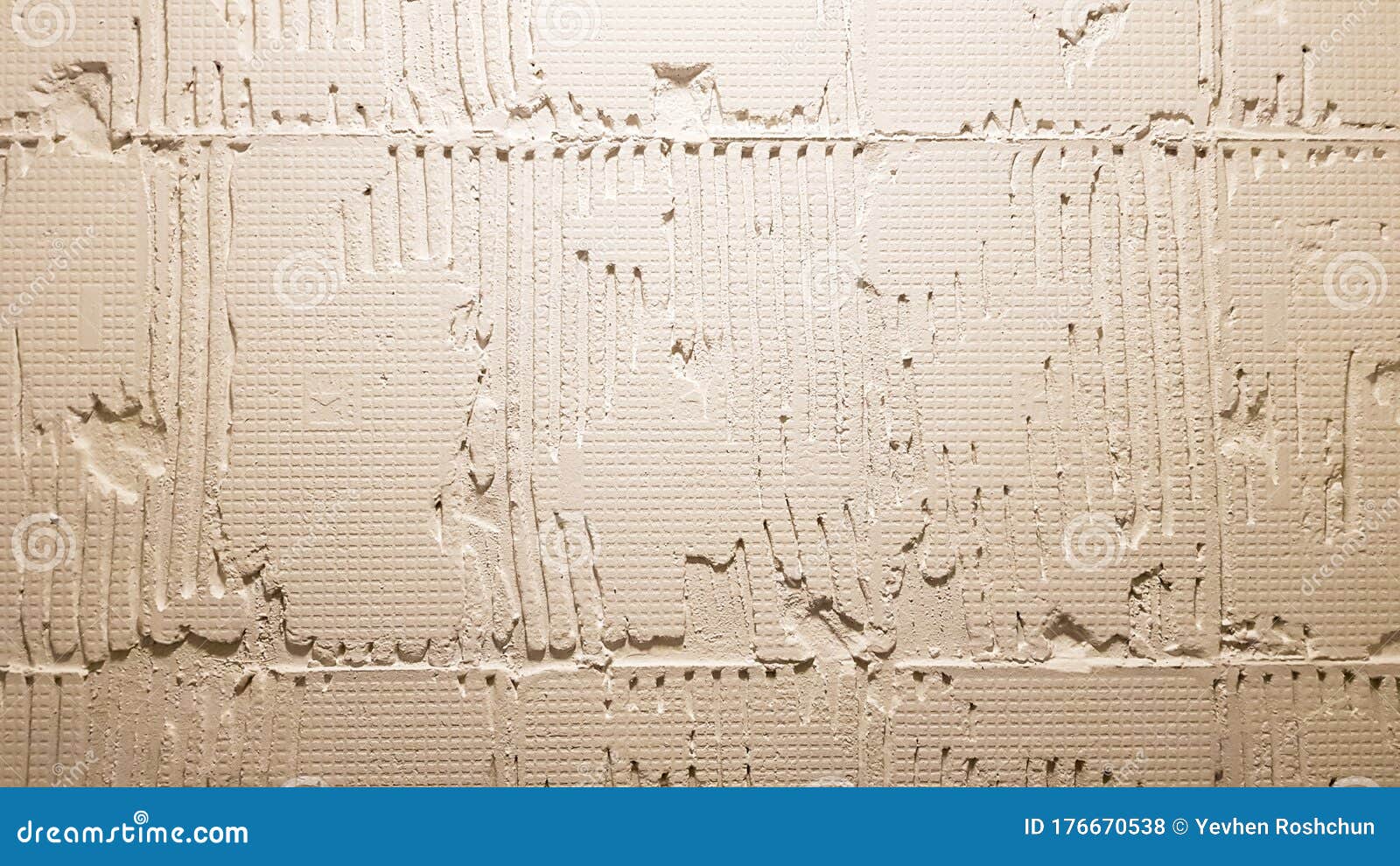 Glue for a Tile with a Gear Pattern. Installation of Tiles Stock Photo ...