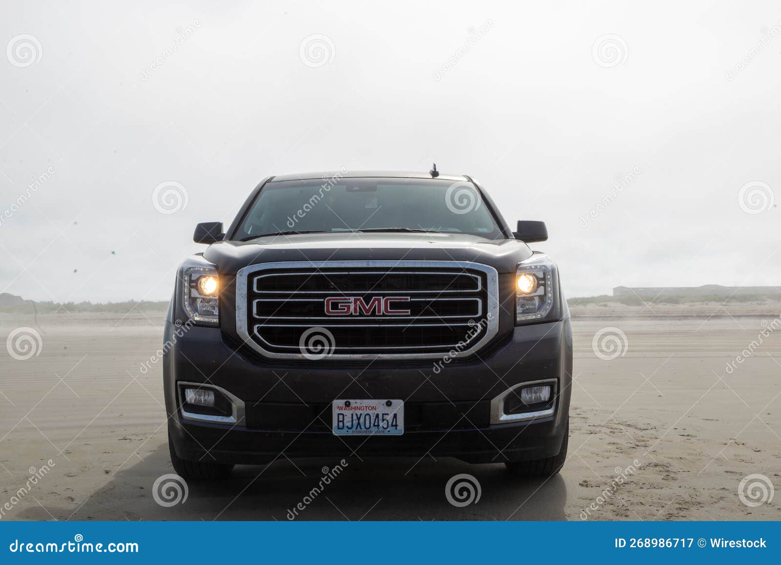 GMC car on a sandy beach editorial photography. Image of road - 268986717