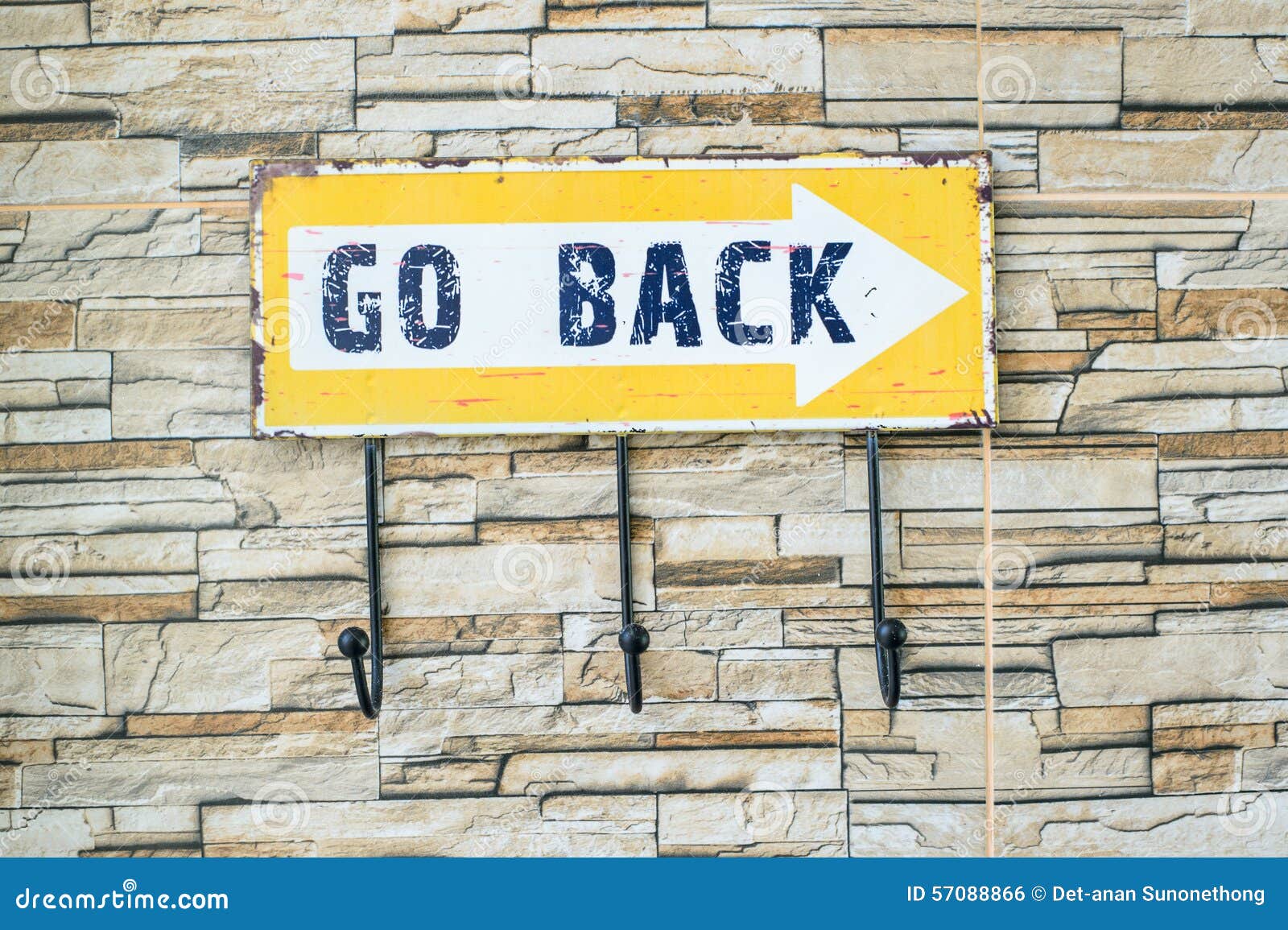 Go back sign on the wall stock photo. Image of background - 57088866