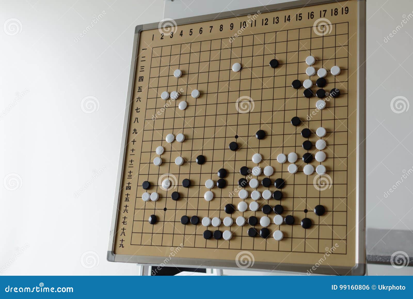 Go board stock photo. Image of culture, black, abstract - 99160806