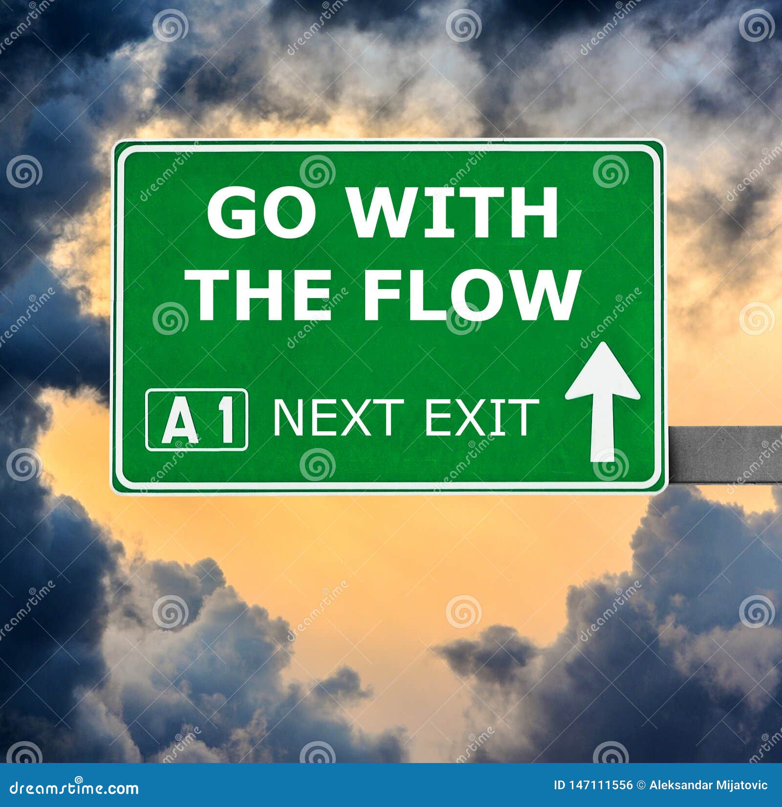 GO with the FLOW Road Sign Against Clear Blue Sky Stock Photo - Image ...