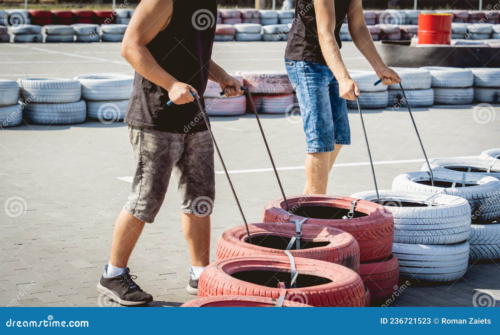 The Go Kart Racing Service Workers Moves Wheels at the Track Stock ...
