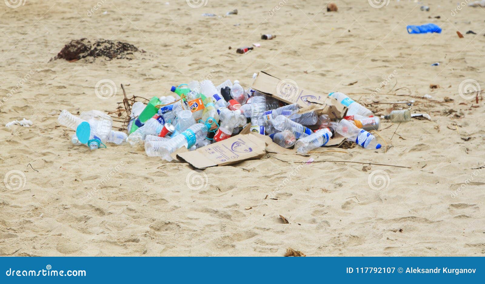 Large Garbage Dump Waste of Plastic Bottles on the Sand Editorial ...