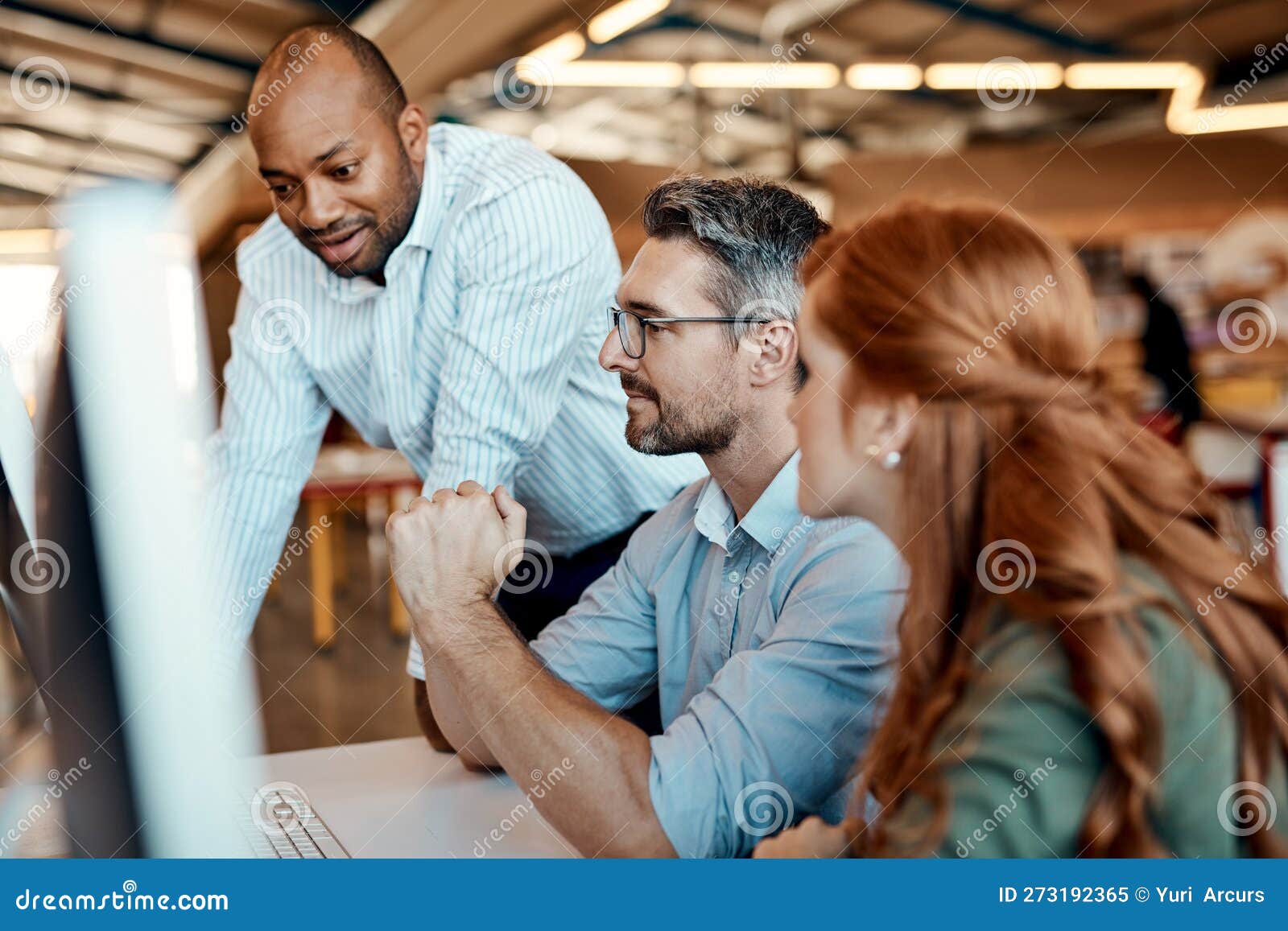 The Goal Oriented Team. a Group of Businesspeople Using a Computer ...