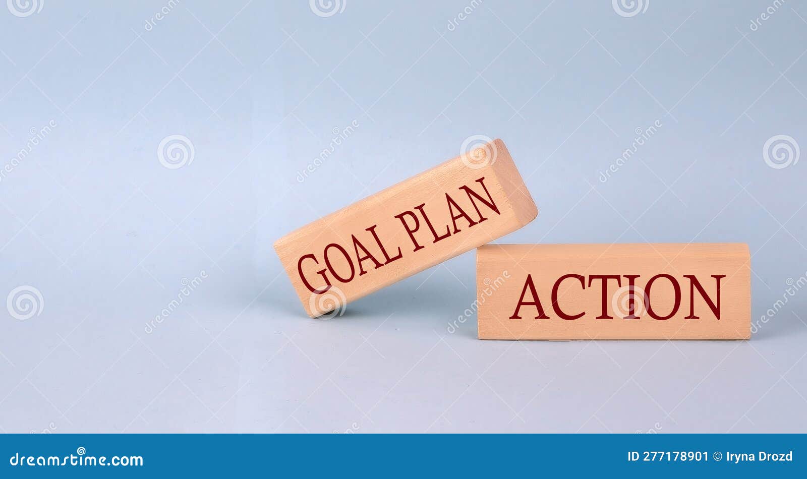 GOAL PLAN ACTION Text on the Wooden Block, Blue Background Stock Image ...