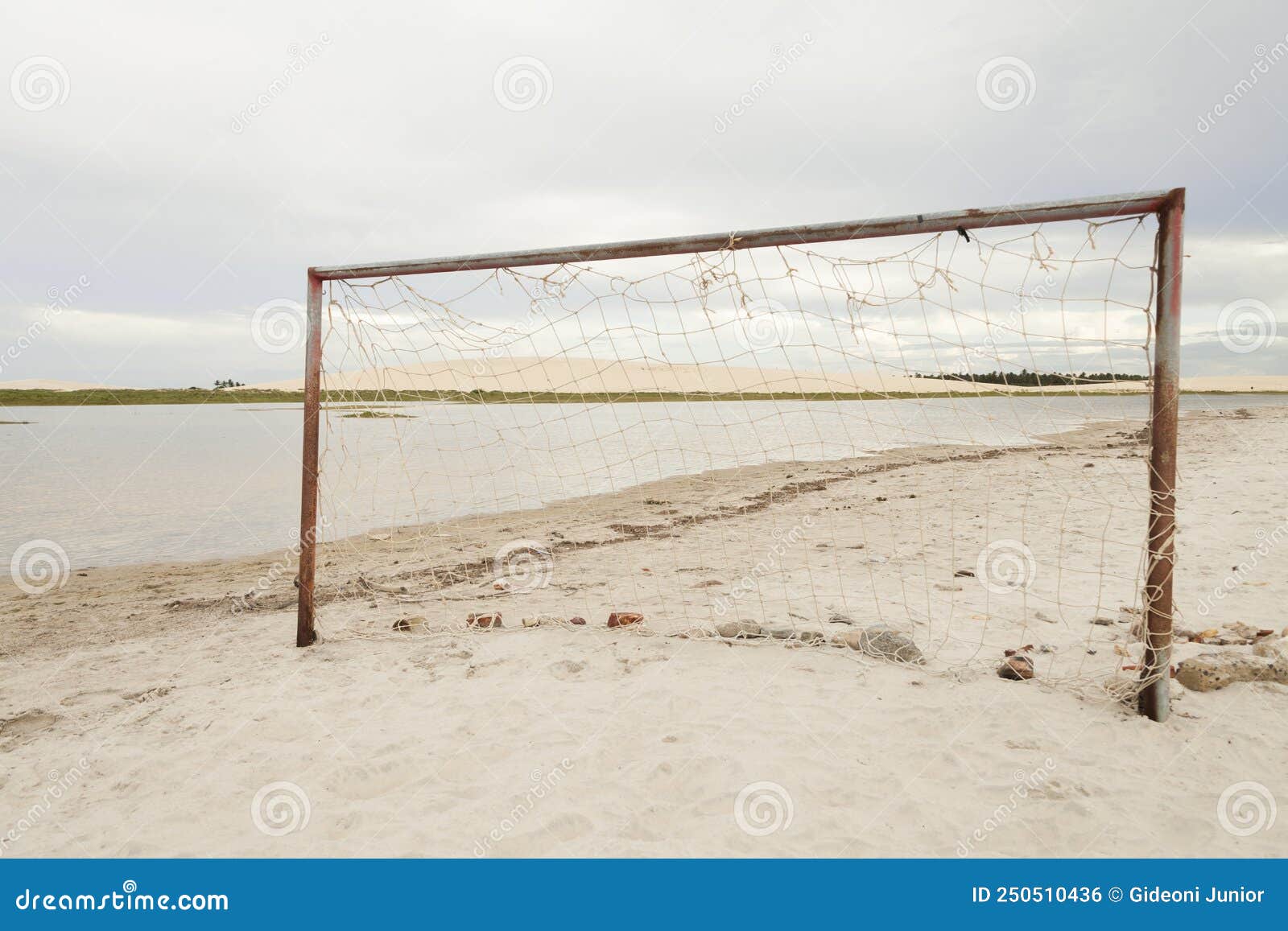 Goal post in beach sand. stock photo. Image of post - 250510436