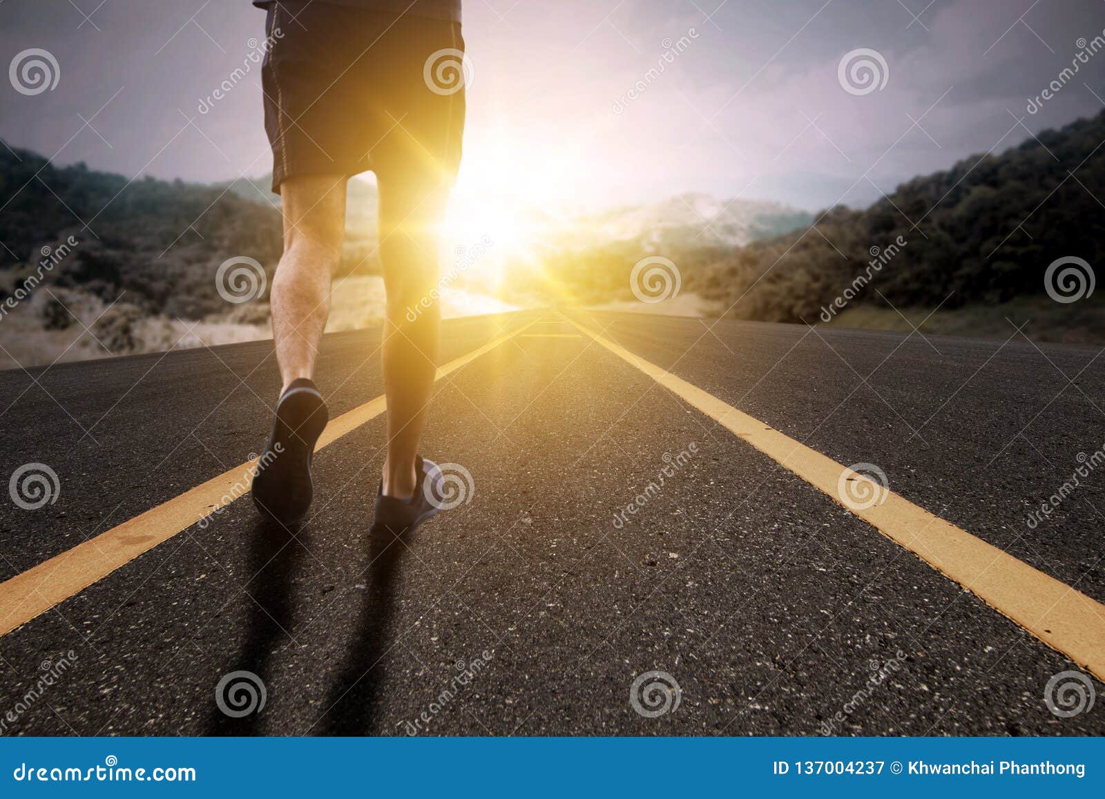 Goal and Strive Concept, Runner Run on Road with Sun Rising Stock Image ...