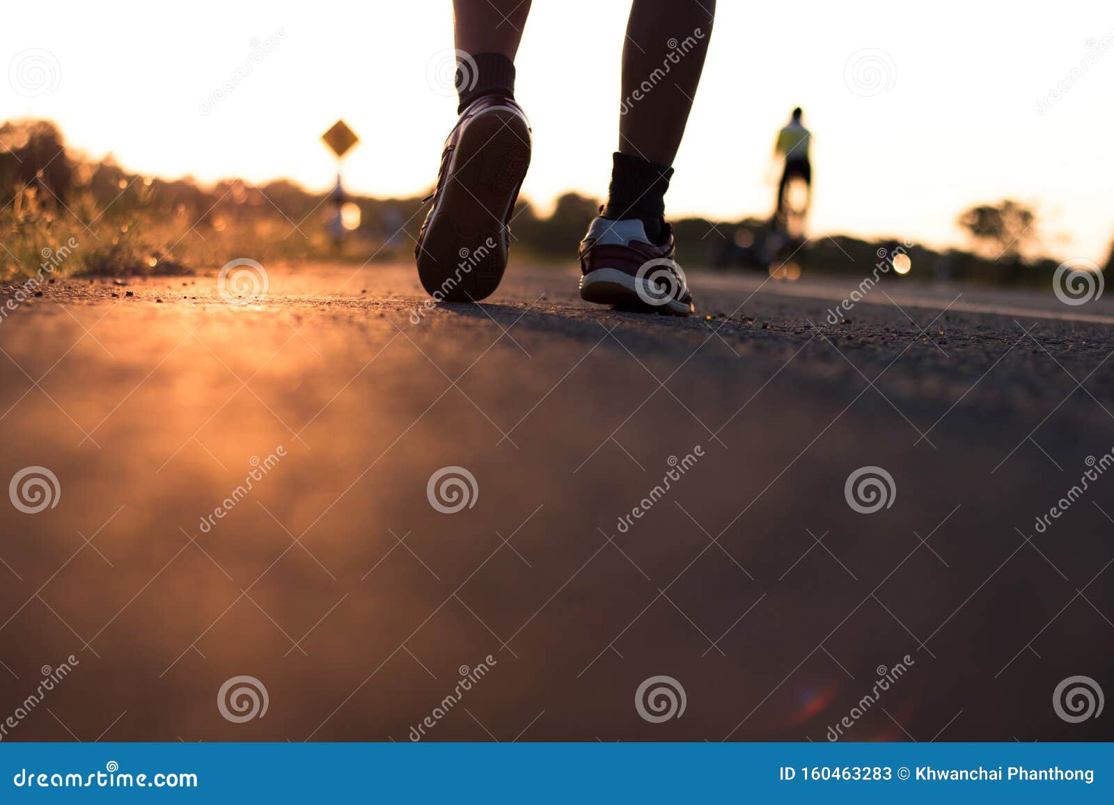 Goal and Strive Concept, Runner Run on Road with Sun Rising Stock Image ...