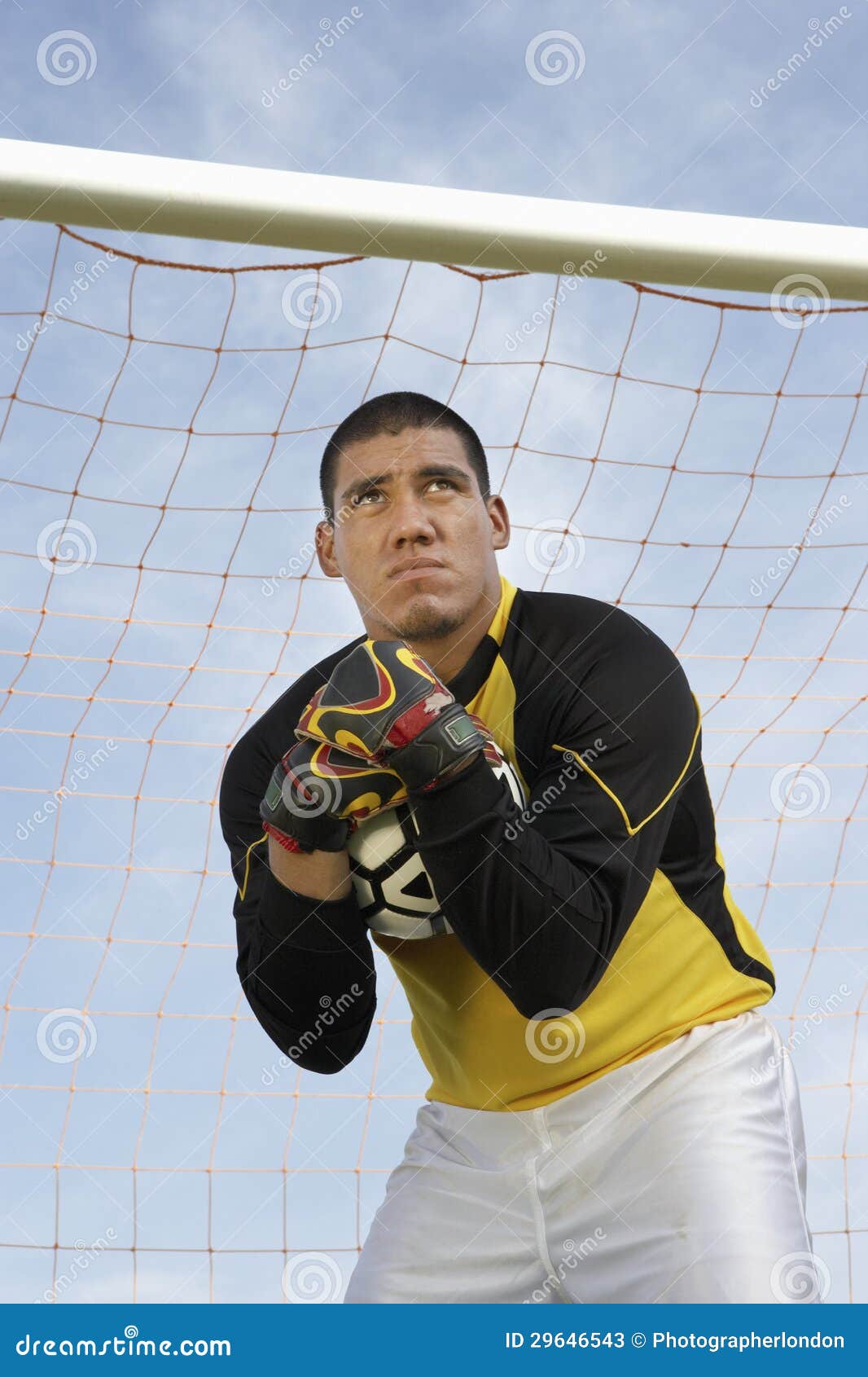 Goalkeeper Catching Ball stock image. Image of ethnicity - 29646543