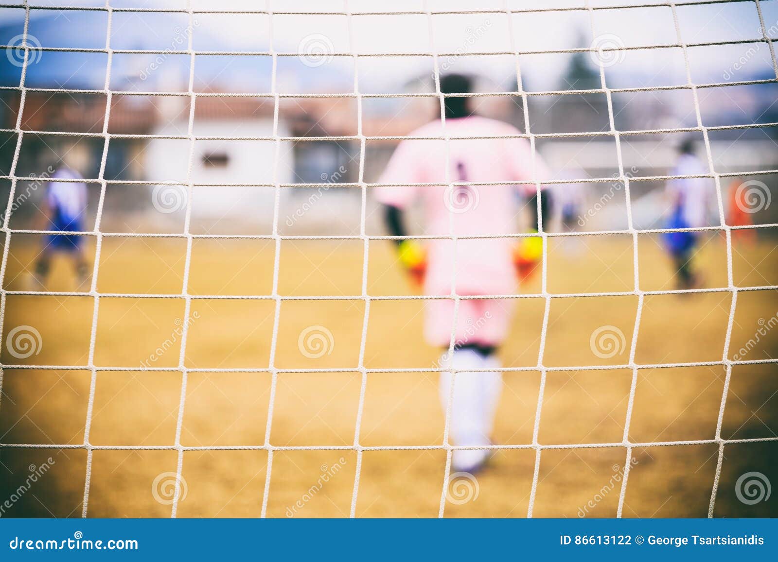 Goalkeeper through a Football Goal Net Stock Photo - Image of male ...