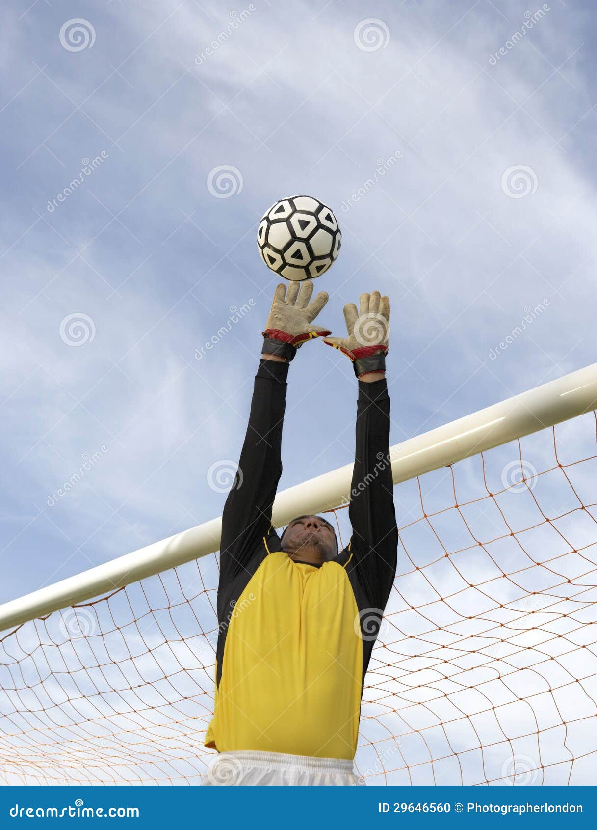 Goalkeeper Jumping To Catch the Ball Stock Photo - Image of latin, play ...