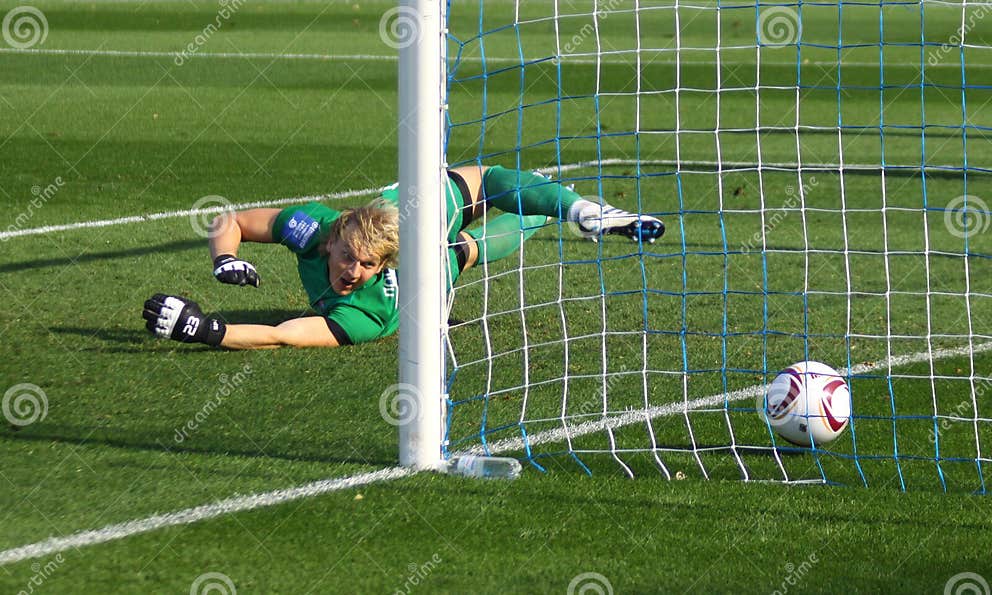 Goalkeeper missing a goal editorial image. Image of grass - 16618400
