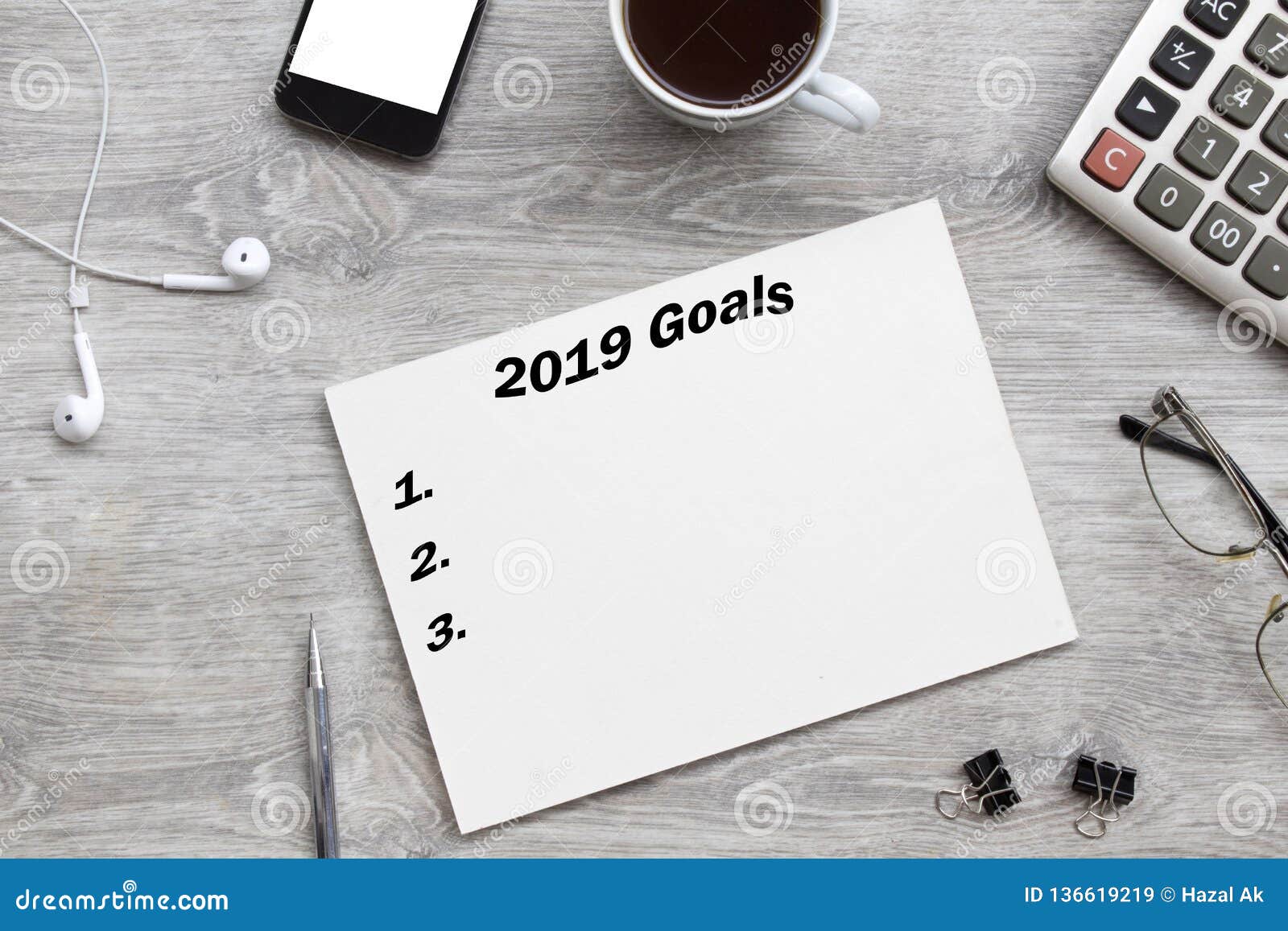 2019 Goals List with Paper, Cup of Coffee Over on Gray Background ...