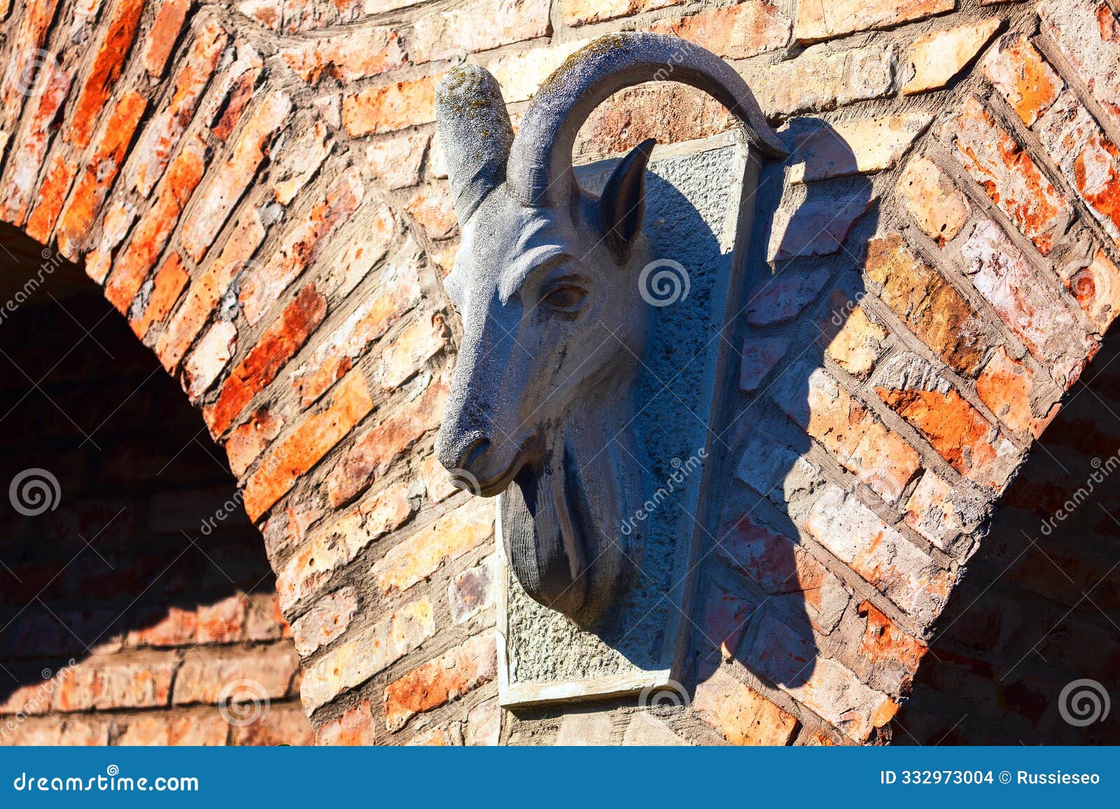 Goat Head is Mounted on a Brick Wall Stock Photo - Image of wildlife ...