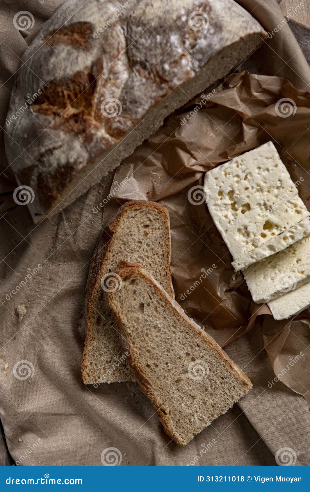 Goat or Sheep Cheese and Bread on the Table Stock Photo - Image of ...