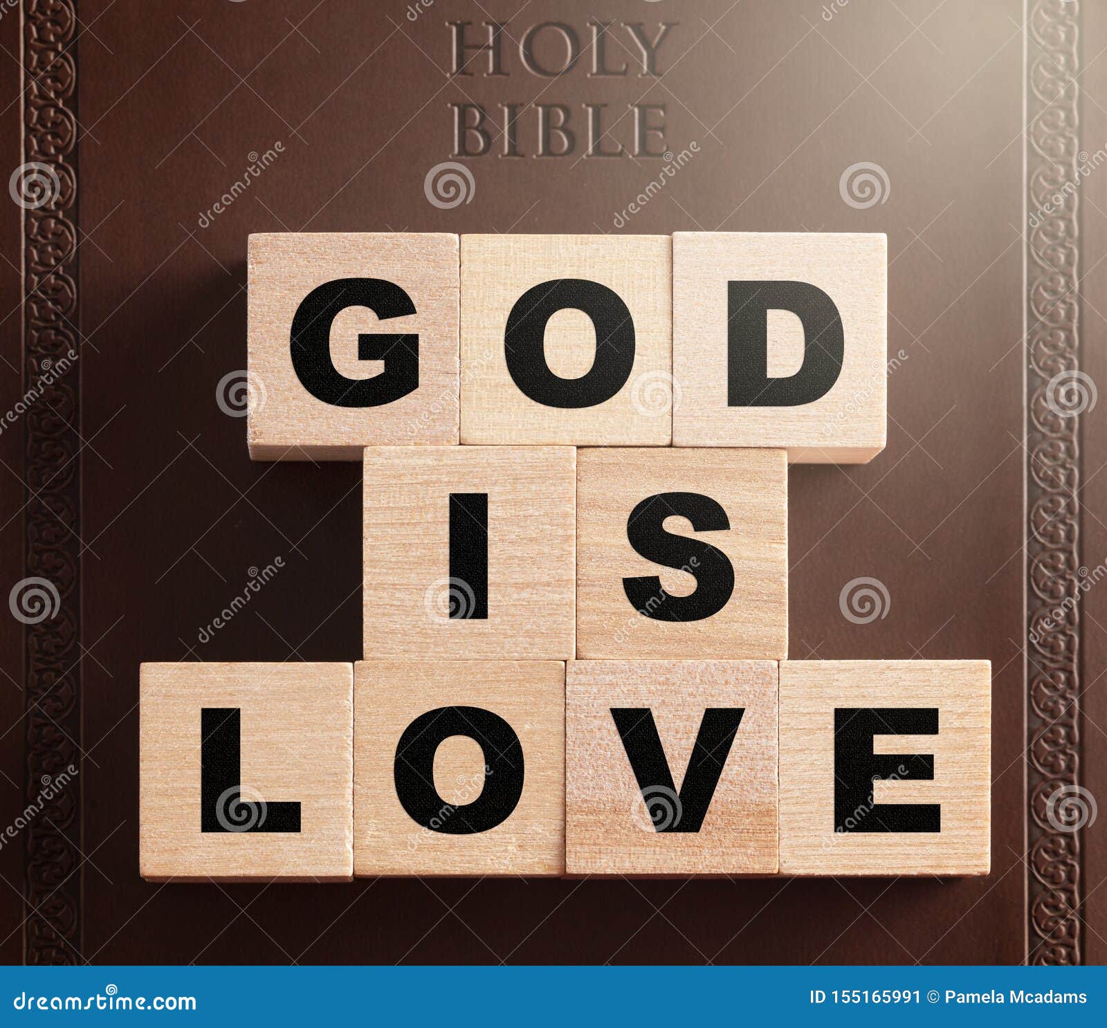 God is Love Spelled in Blocks on a Leather Holy Bible Stock Image ...