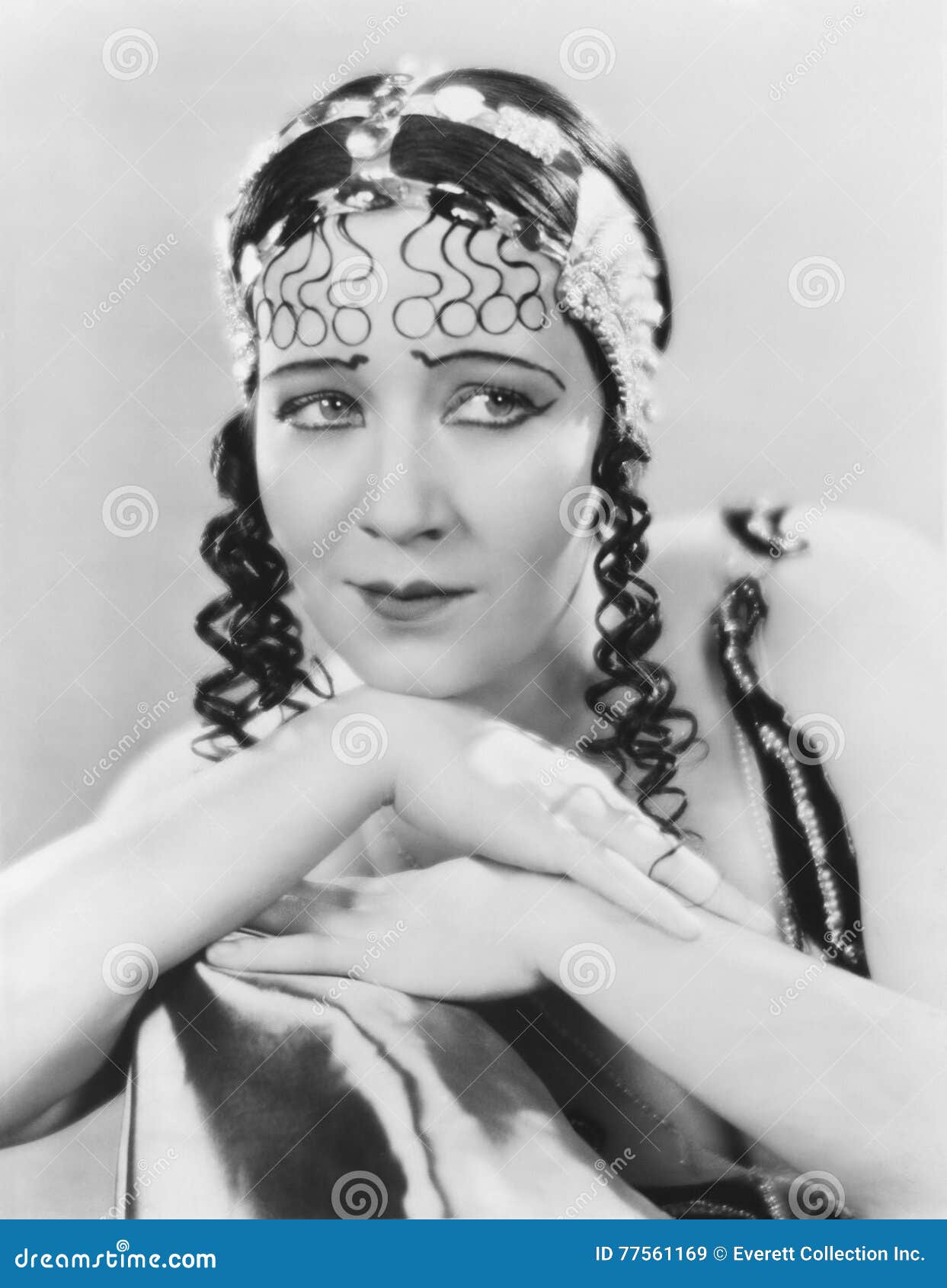 Goddess in corkscrew curls stock image. Image of holding - 77561169