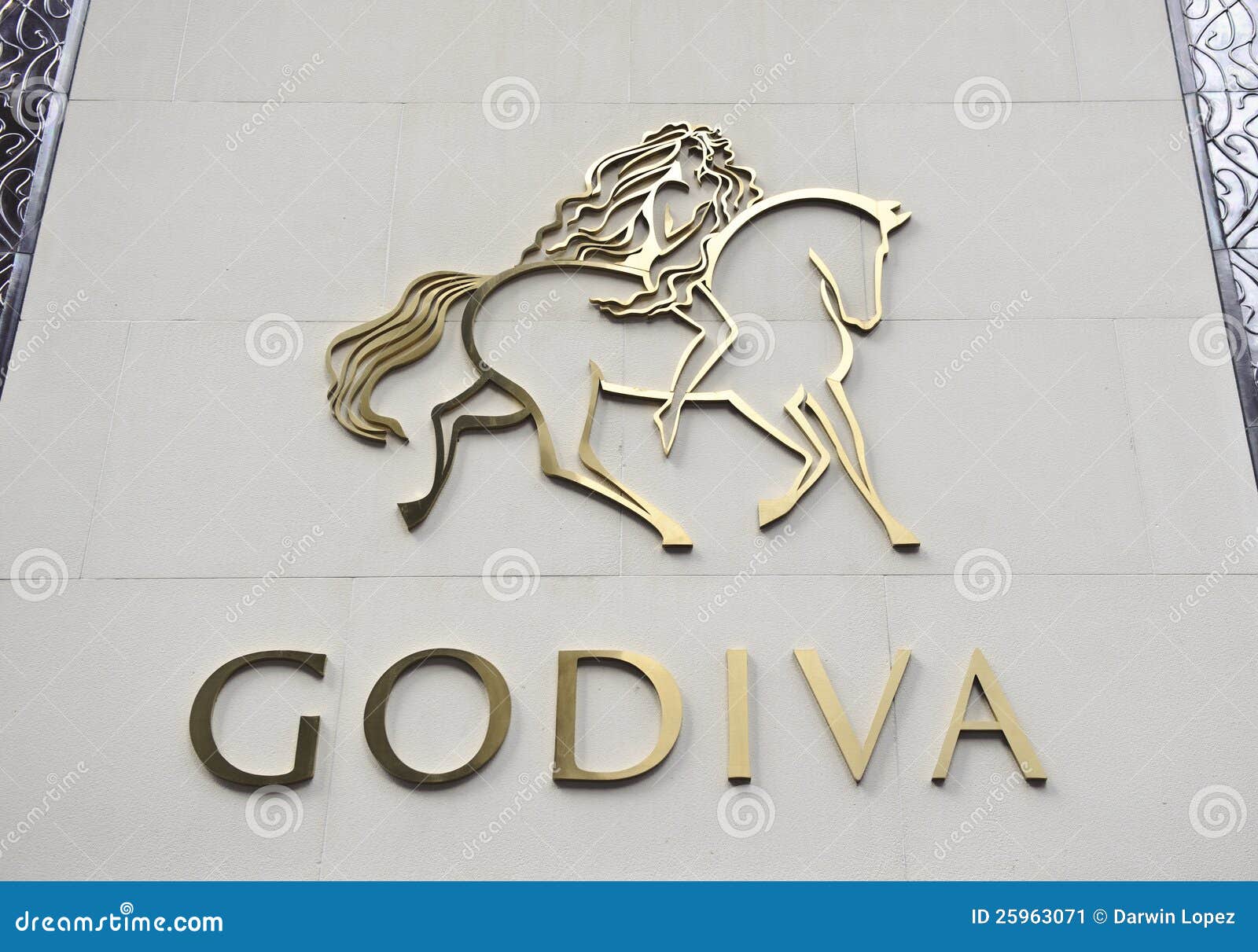 Godiva logo on store wall editorial photo. Image of boxed - 25963071