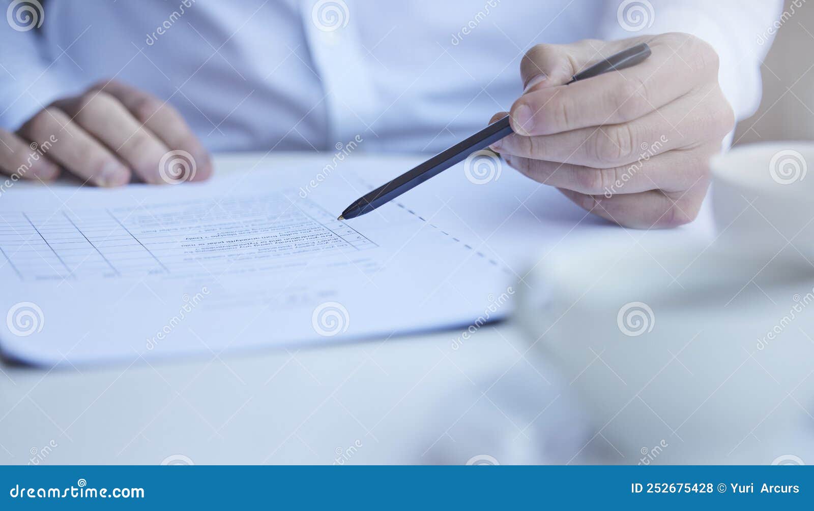 He always Goes through Paperwork Thoroughly. an Unrecognizable ...