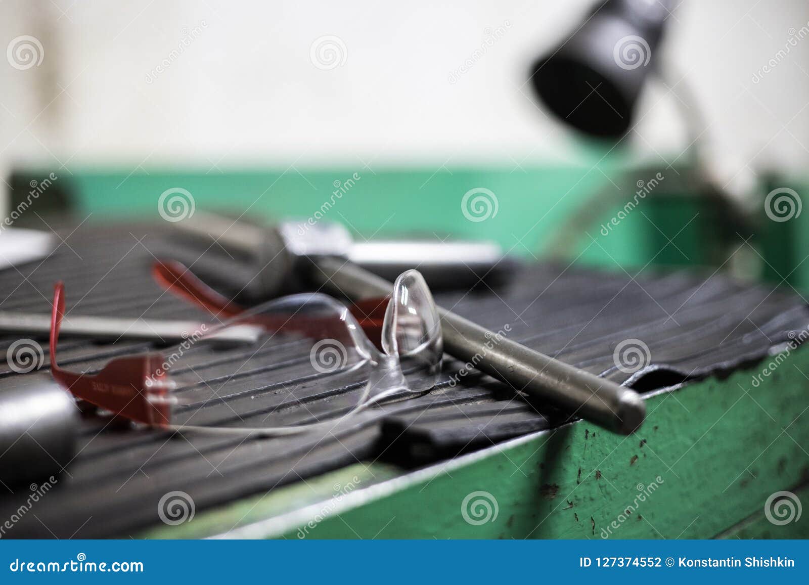 Goggles Lie on the Table in the Factory Workshop Stock Photo - Image of ...