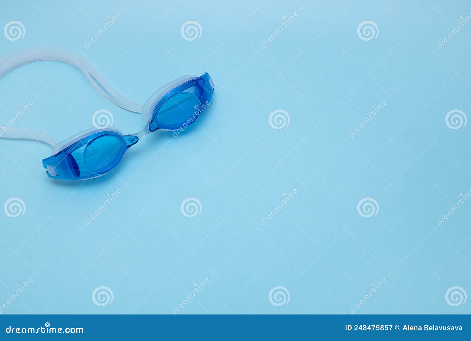 Goggles for Swimming on a Blue Background with Copy Space Stock Image ...