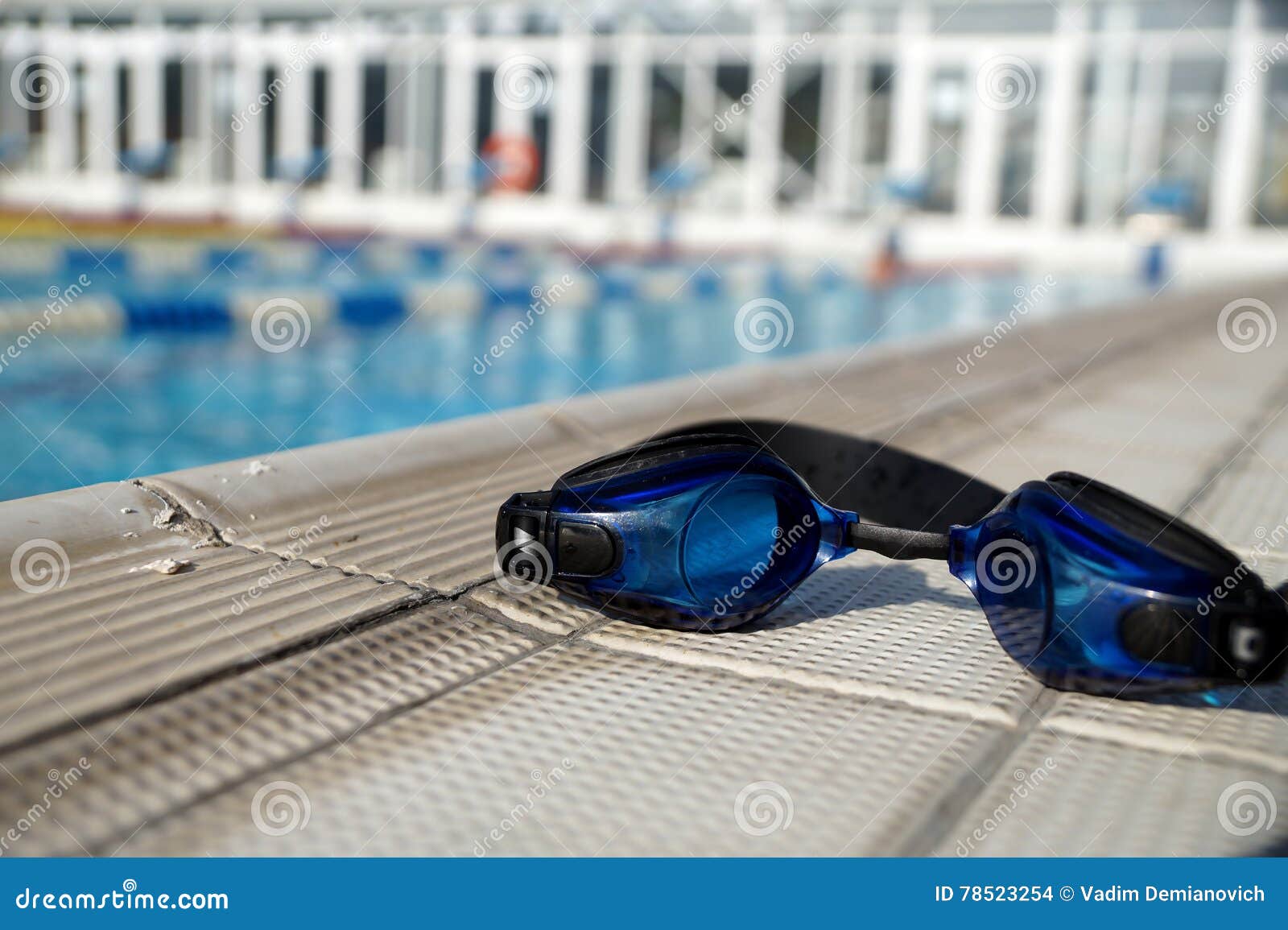 Goggles for Swimming on a Pool Side Stock Photo - Image of black ...