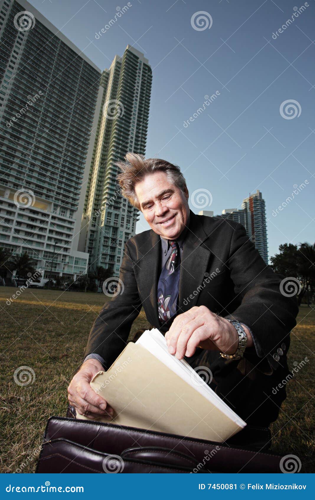 Going through files stock image. Image of grass, smile - 7450081