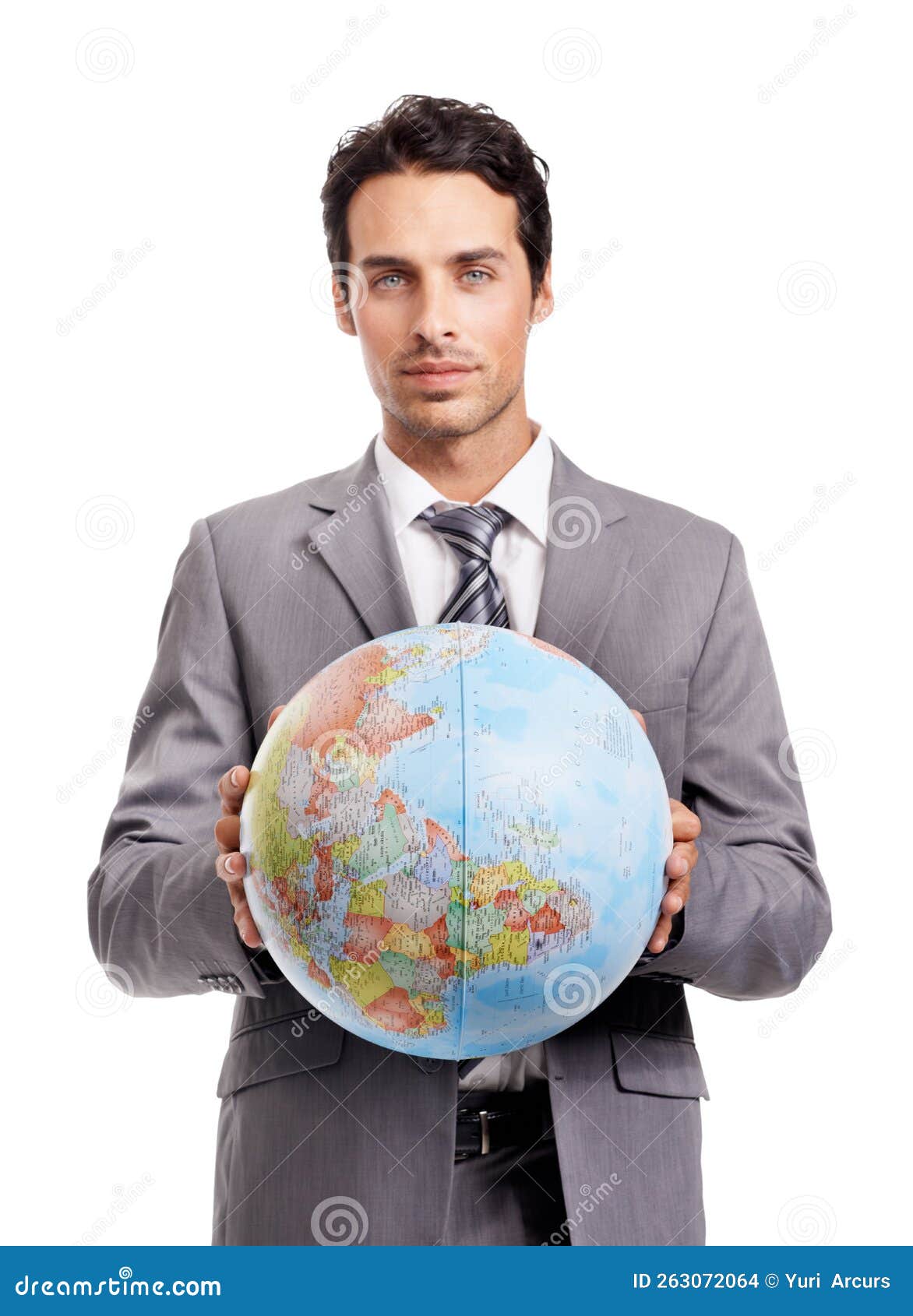 Going Global. a Handsome Young Executive Holding a Globe while Isolated ...