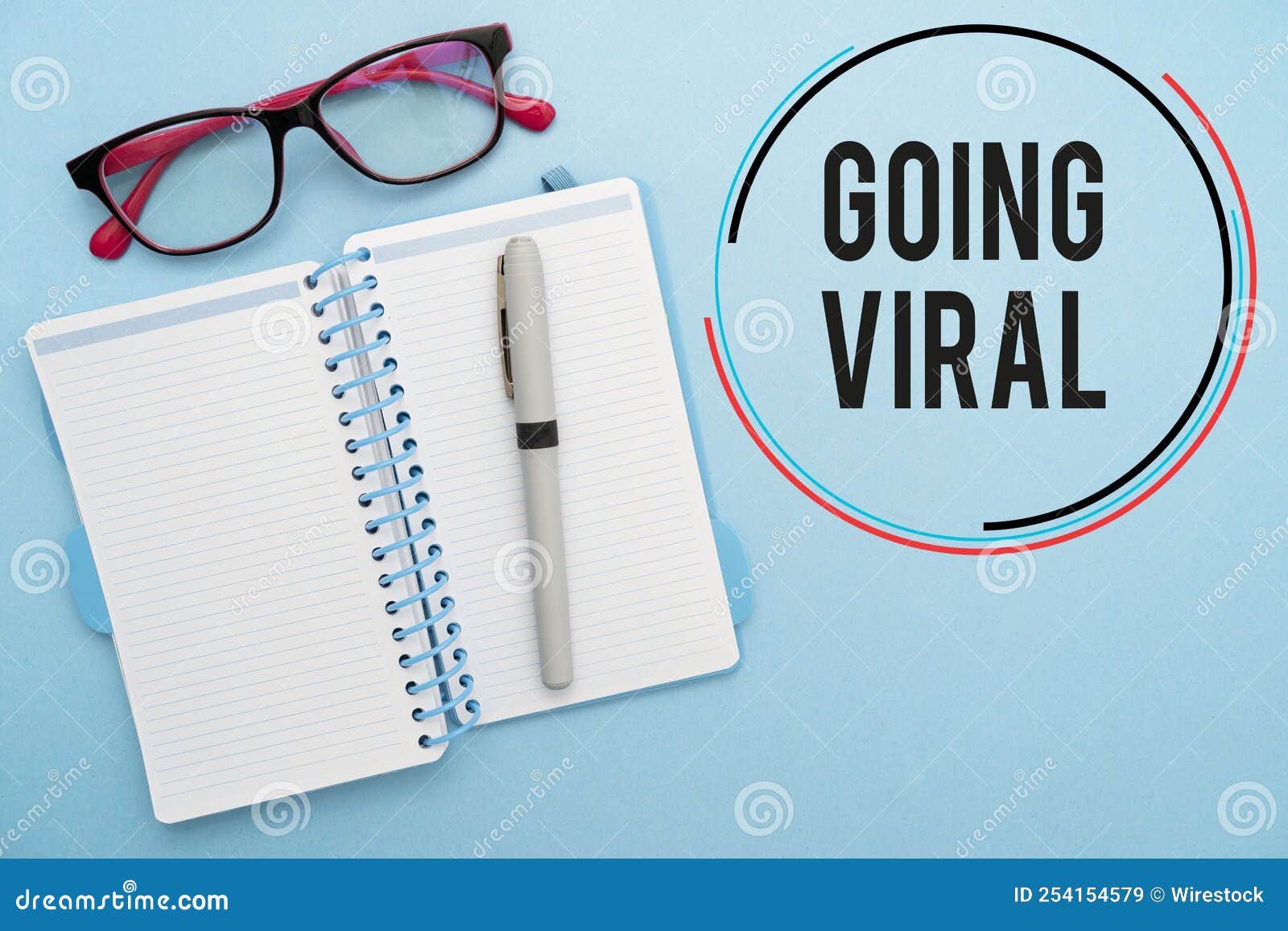 GOING VIRAL Conceptual Text in a Circle with Blue Background beside a ...