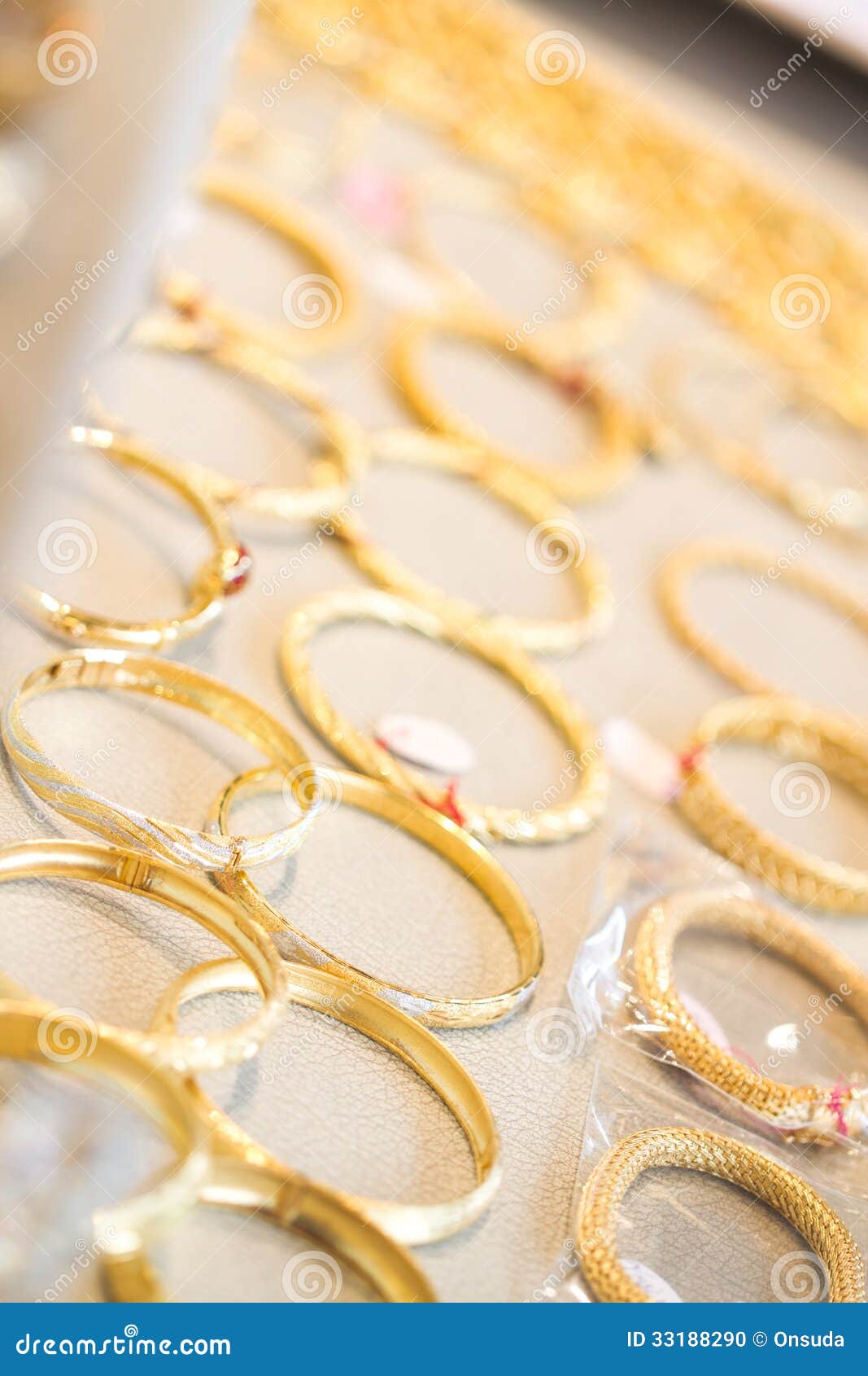 Gold bangles stock photo. Image of expensive, shiny, jewelry - 33188290