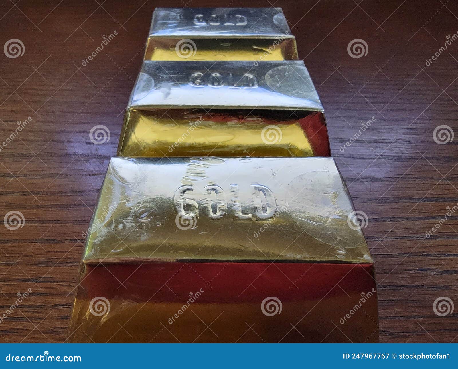 Gold Bars or Blocks on Wood Desk or Surface Stock Image - Image of gold ...