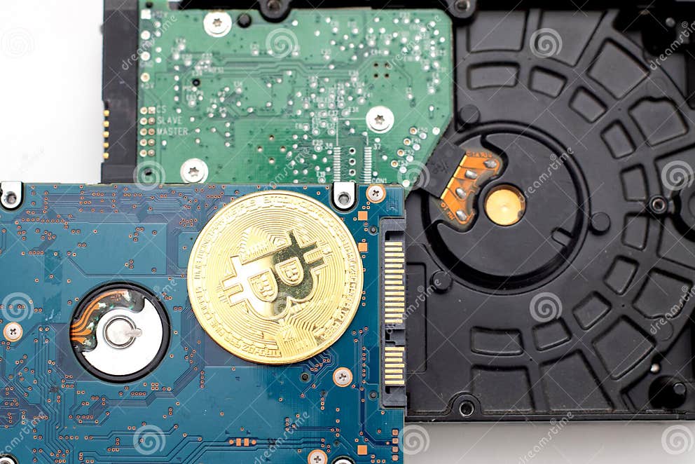 Gold Bitcoin Coin on a Hard Disk Drive Stock Image - Image of coin ...