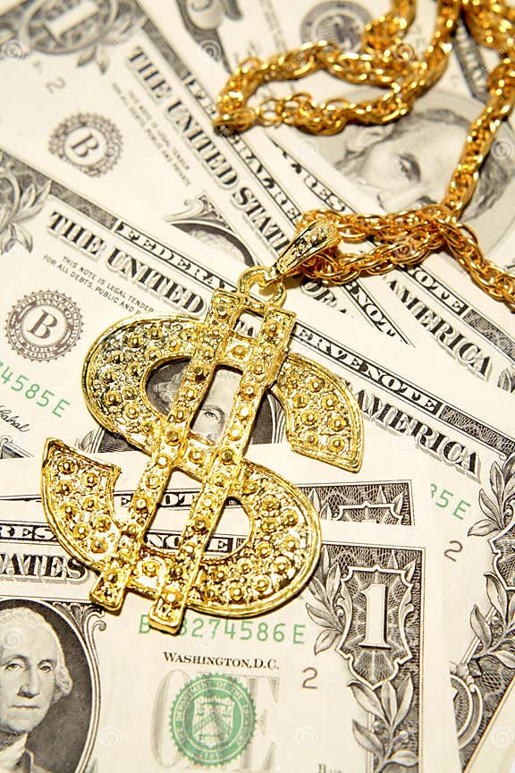 Gold bling on money stock image. Image of possession, fancy - 6484337