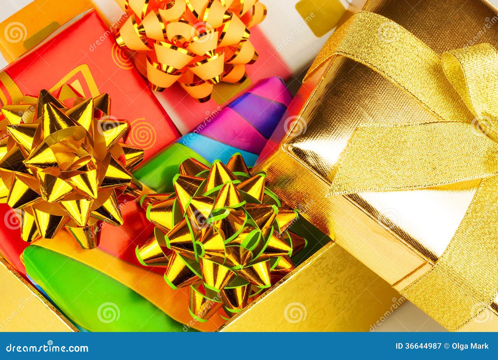 Gold box with gifts inside stock image. Image of birthday - 36644987