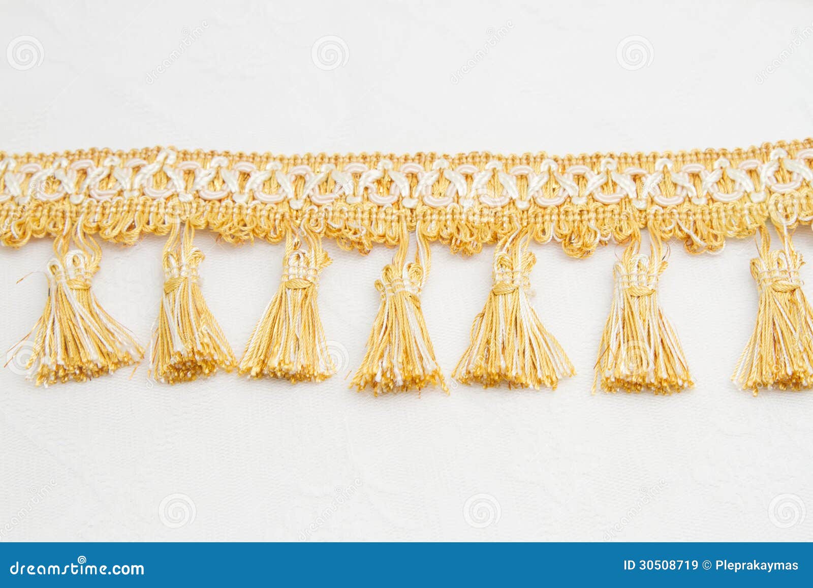 Gold brush made of thread stock image. Image of beads - 30508719
