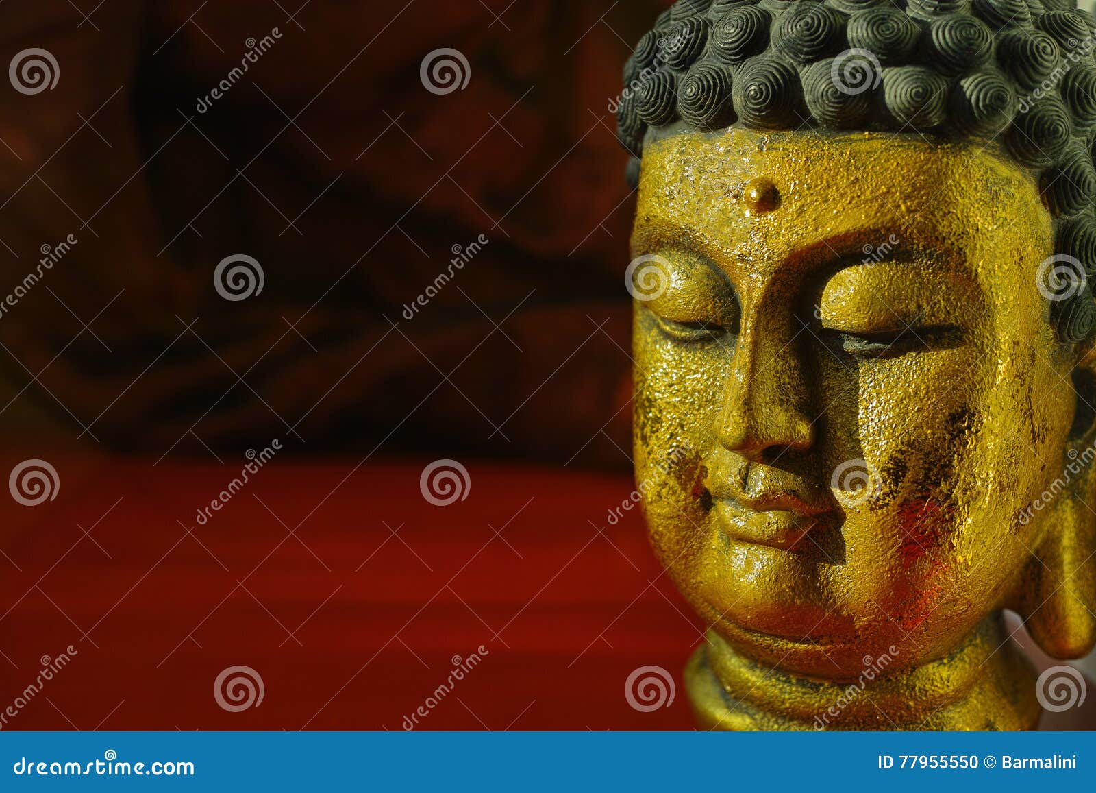 Gold Buddha Tranquil Face on Dark Red Background, Copy Space Stock ...