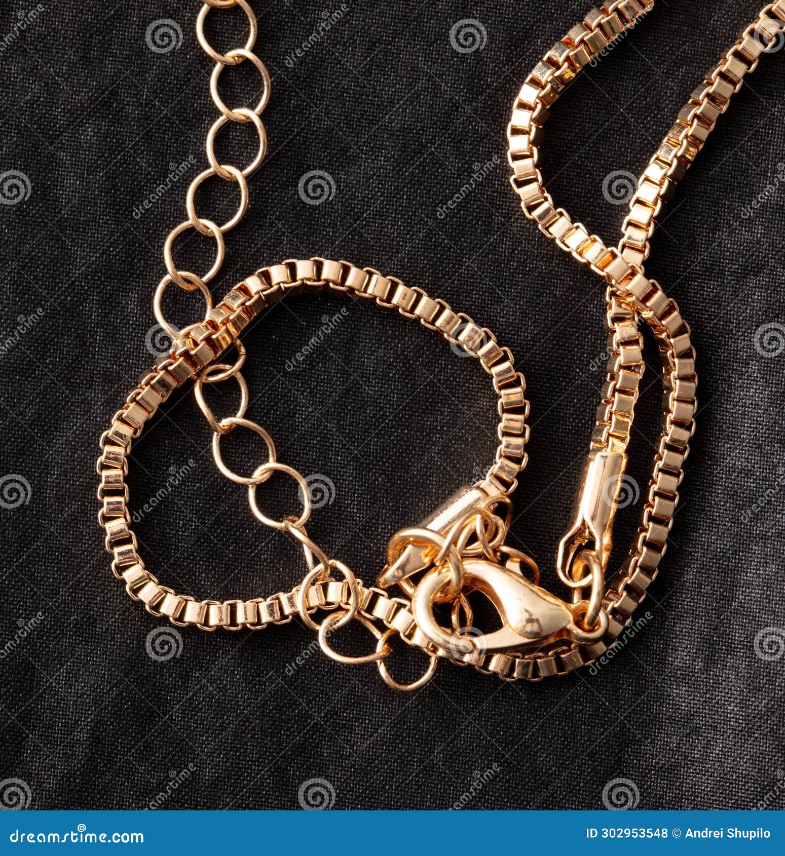 Gold Chain on Black Silk Fabric. Close-up Stock Photo - Image of jewel ...