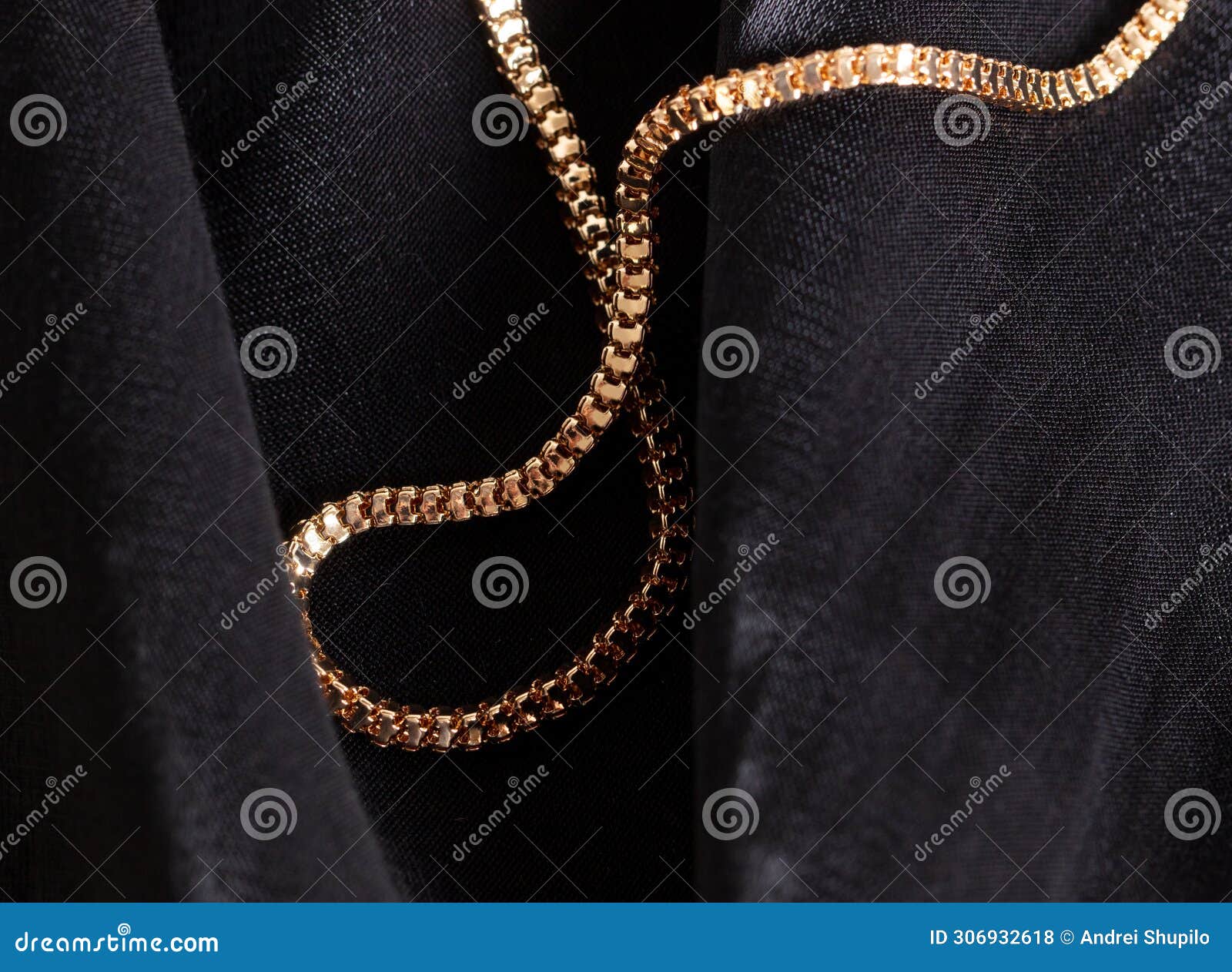 Gold Chain on Black Silk Fabric. Close-up Stock Photo - Image of ...