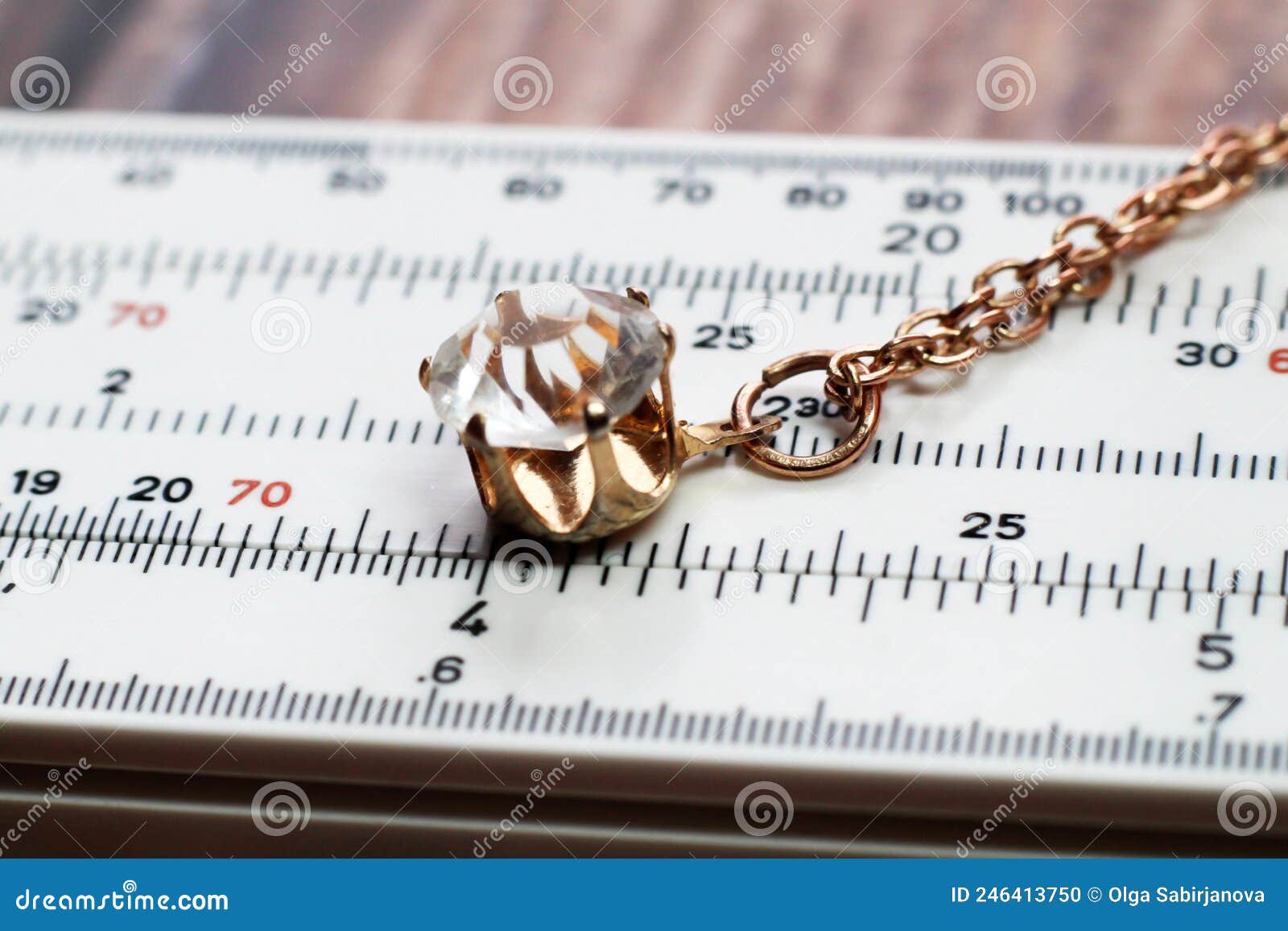 Gold Chain with a Large Diamond on a Ruler in a Pawnshop, Macro Stock ...