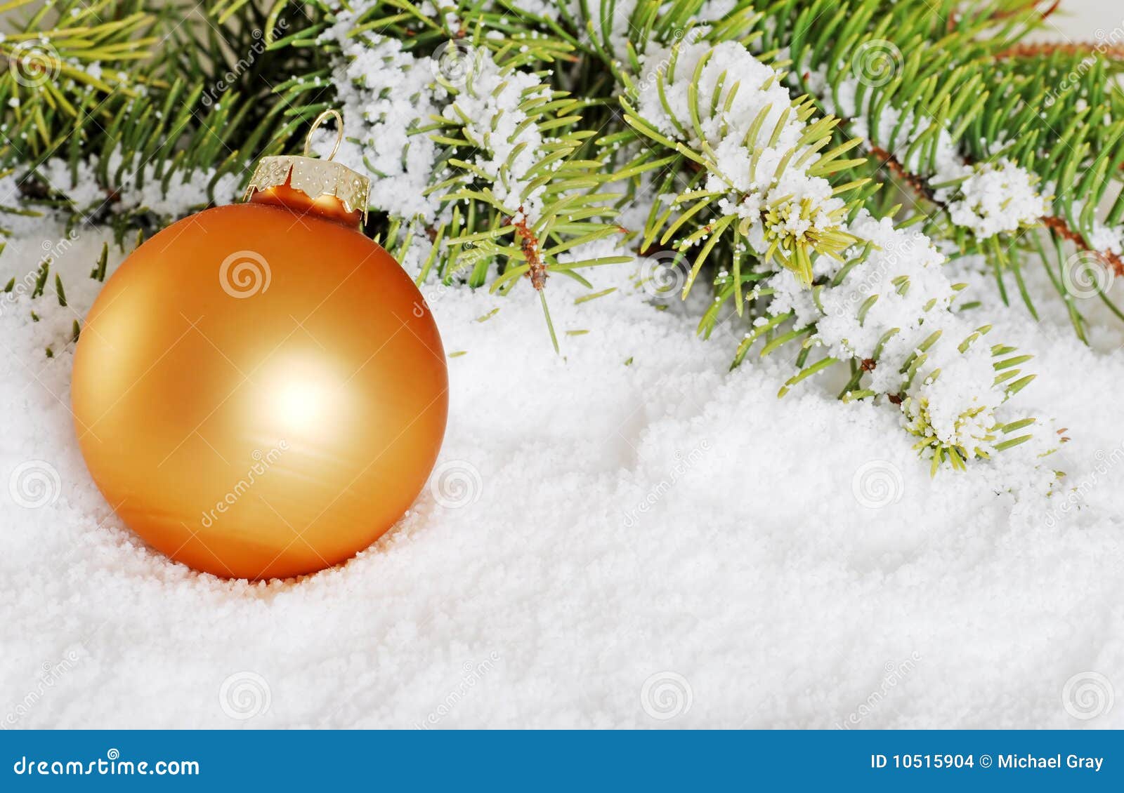Gold Christmas Ball in Snow Stock Photo - Image of gold, round: 10515904